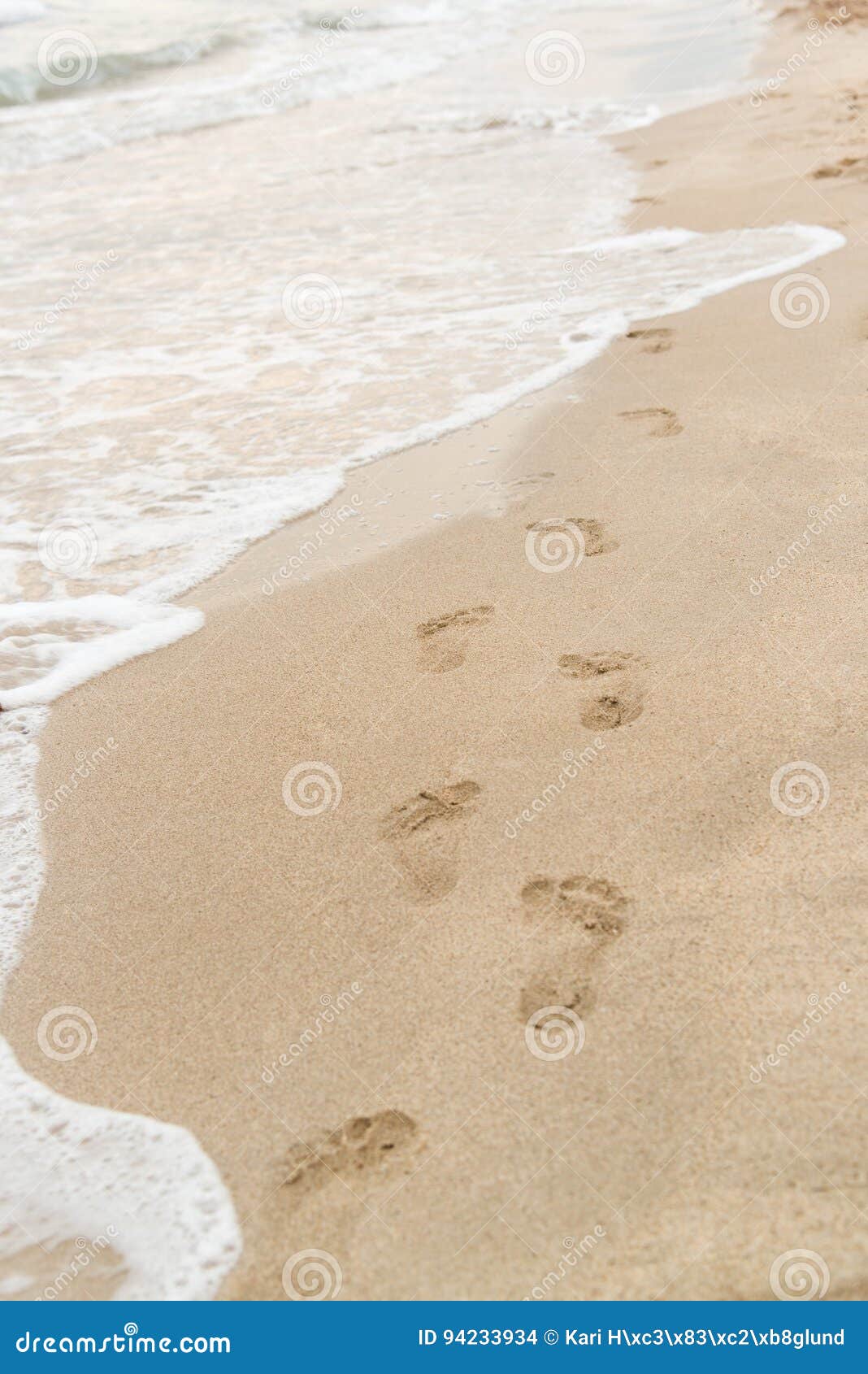 Footsteps in the Sand by the Shore Stock Photo - Image of coast ...