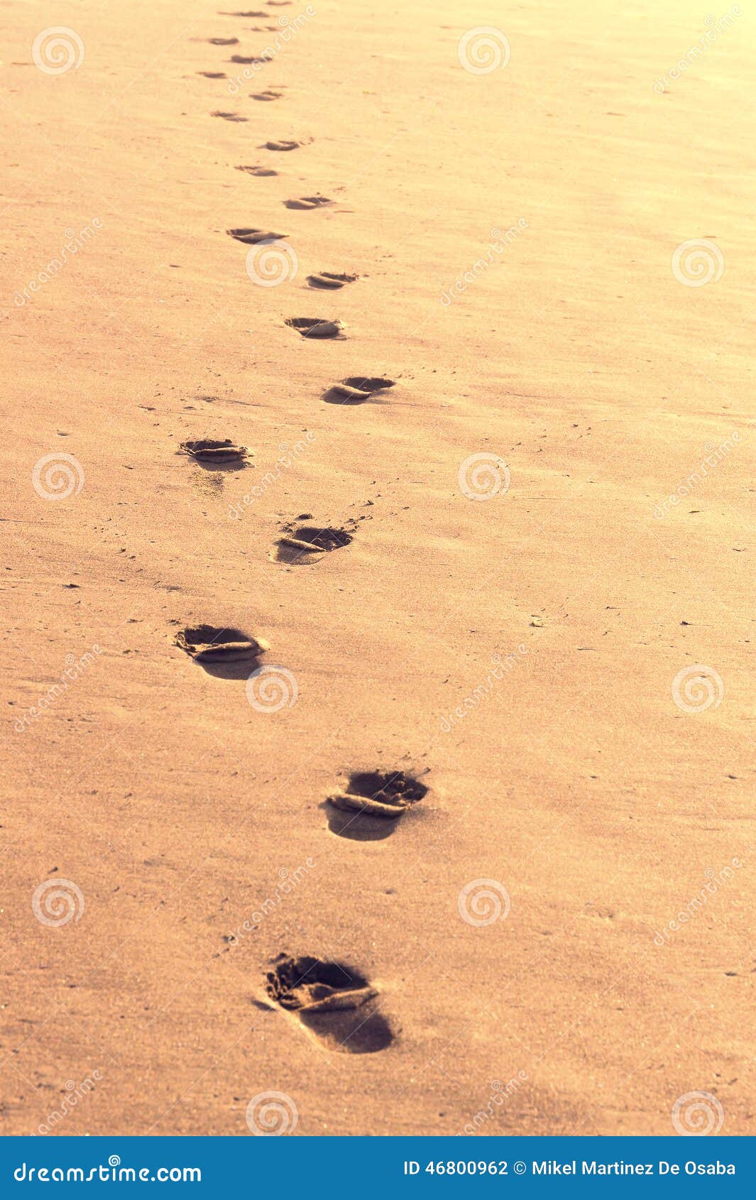 Footsteps in the sand stock photo. Image of footstep - 46800962