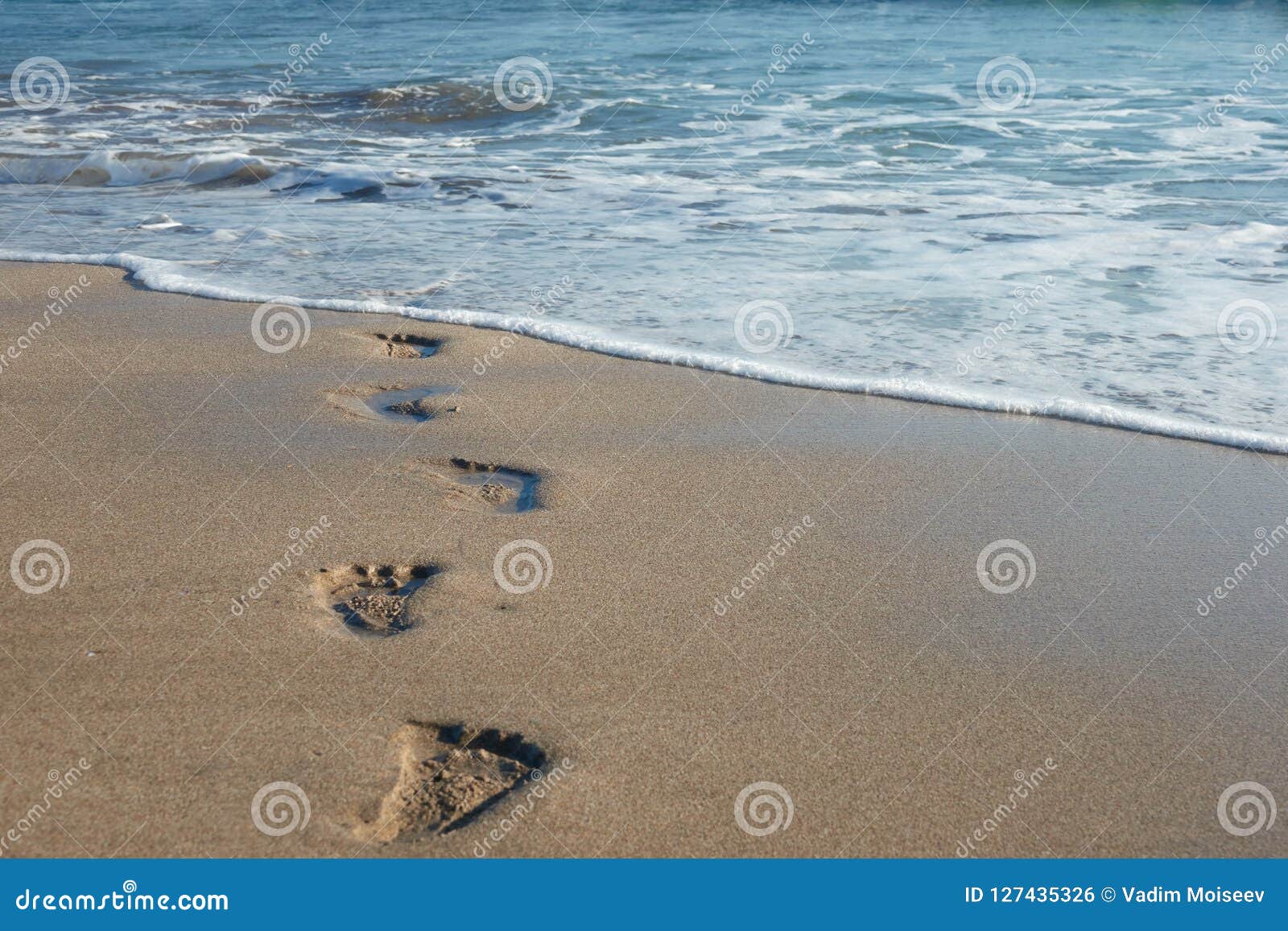 Footsteps on a Sandy Beach Toward a Sea Stock Photo - Image of seaside ...