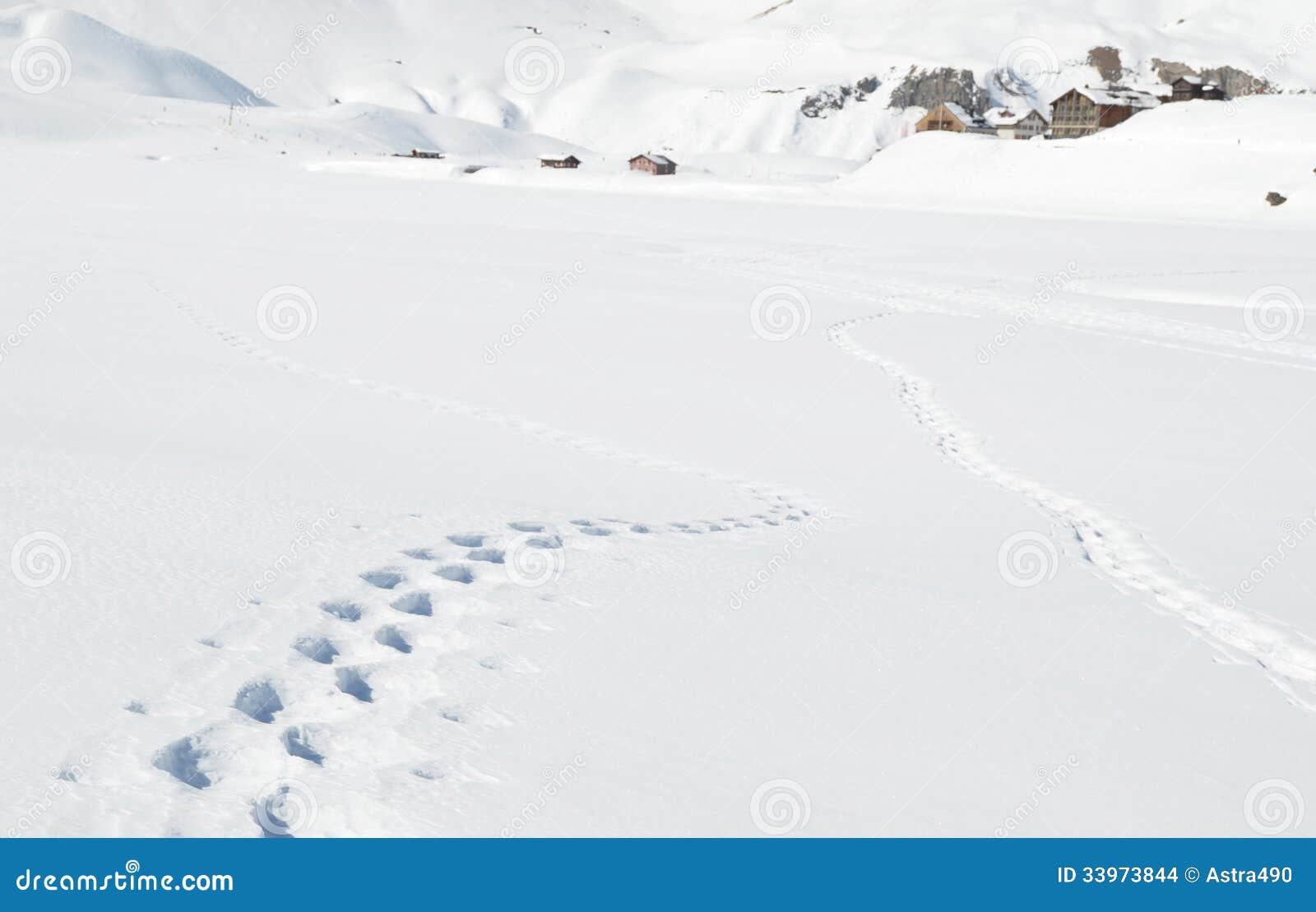 Footsteps on the snow stock photo. Image of mountain - 33973844