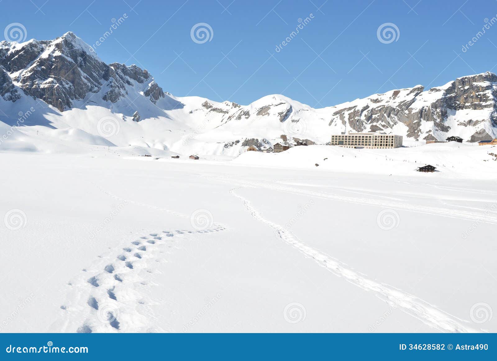 Footsteps on the snow stock photo. Image of alps, rescue - 34628582