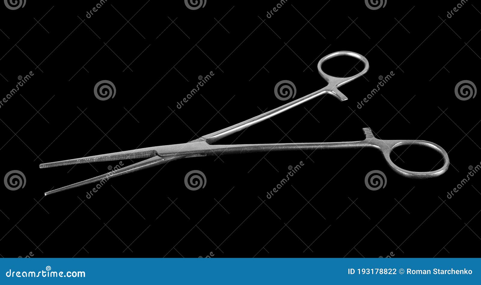 Forceps Isolated on a Black Background Stock Photo - Image of clutch ...