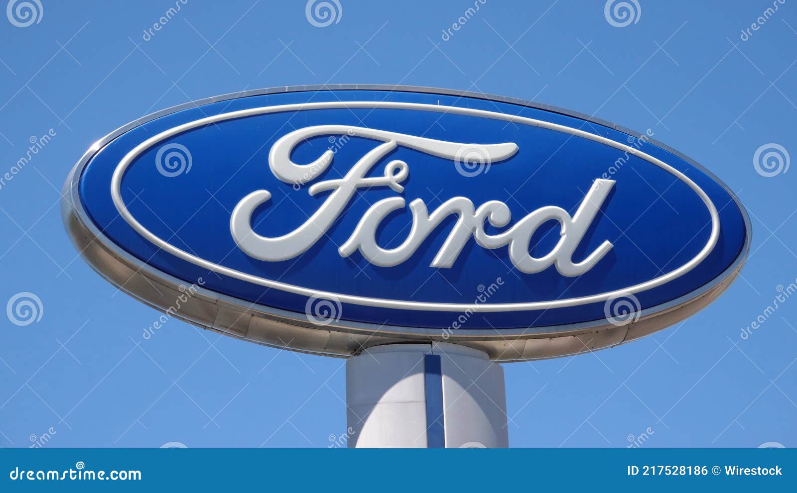 Ford logo in blue sky editorial photo. Image of dealership - 217528186