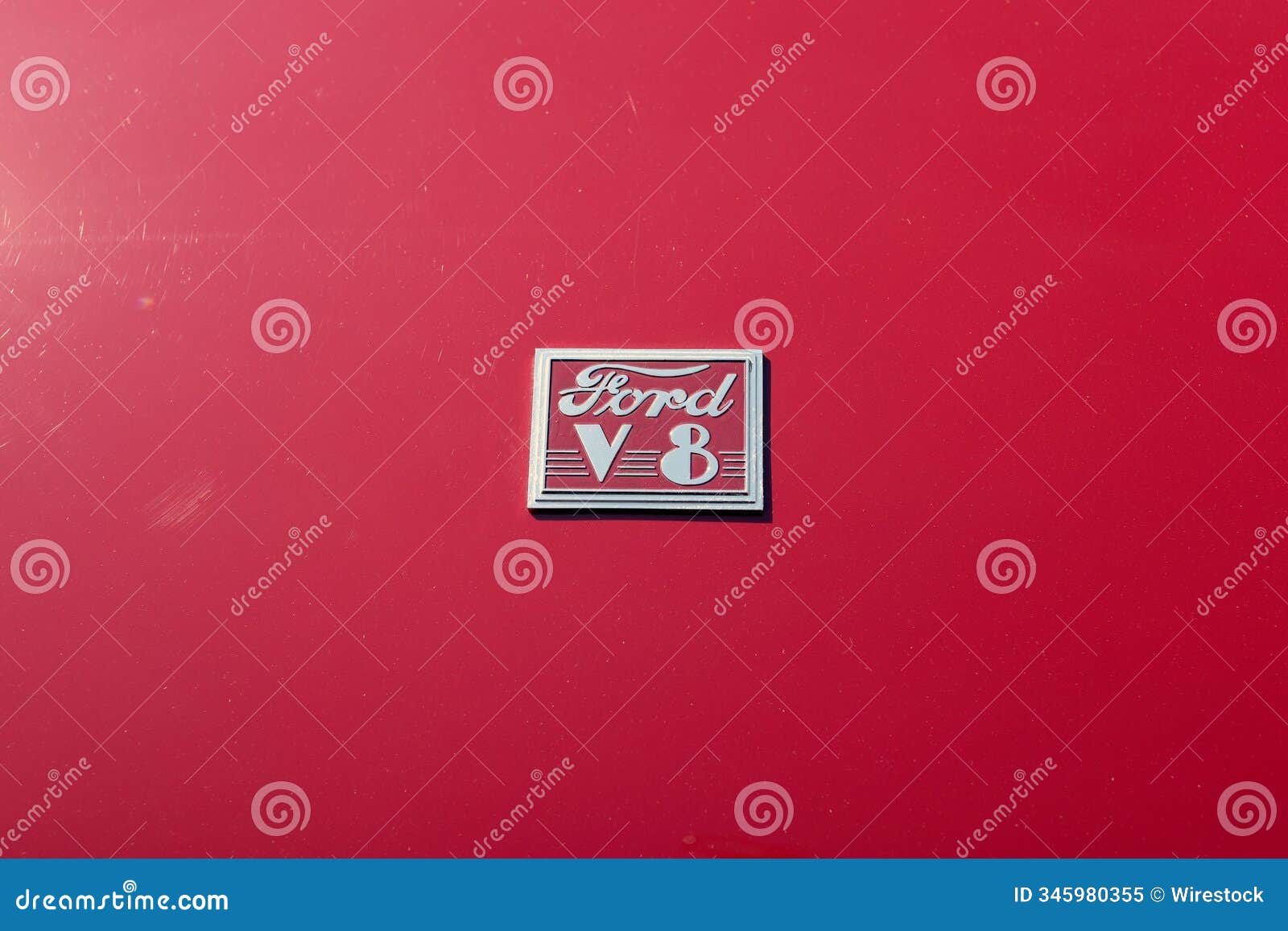 Ford V8 Badge On Red Surface Editorial Photo | CartoonDealer.com #345980355