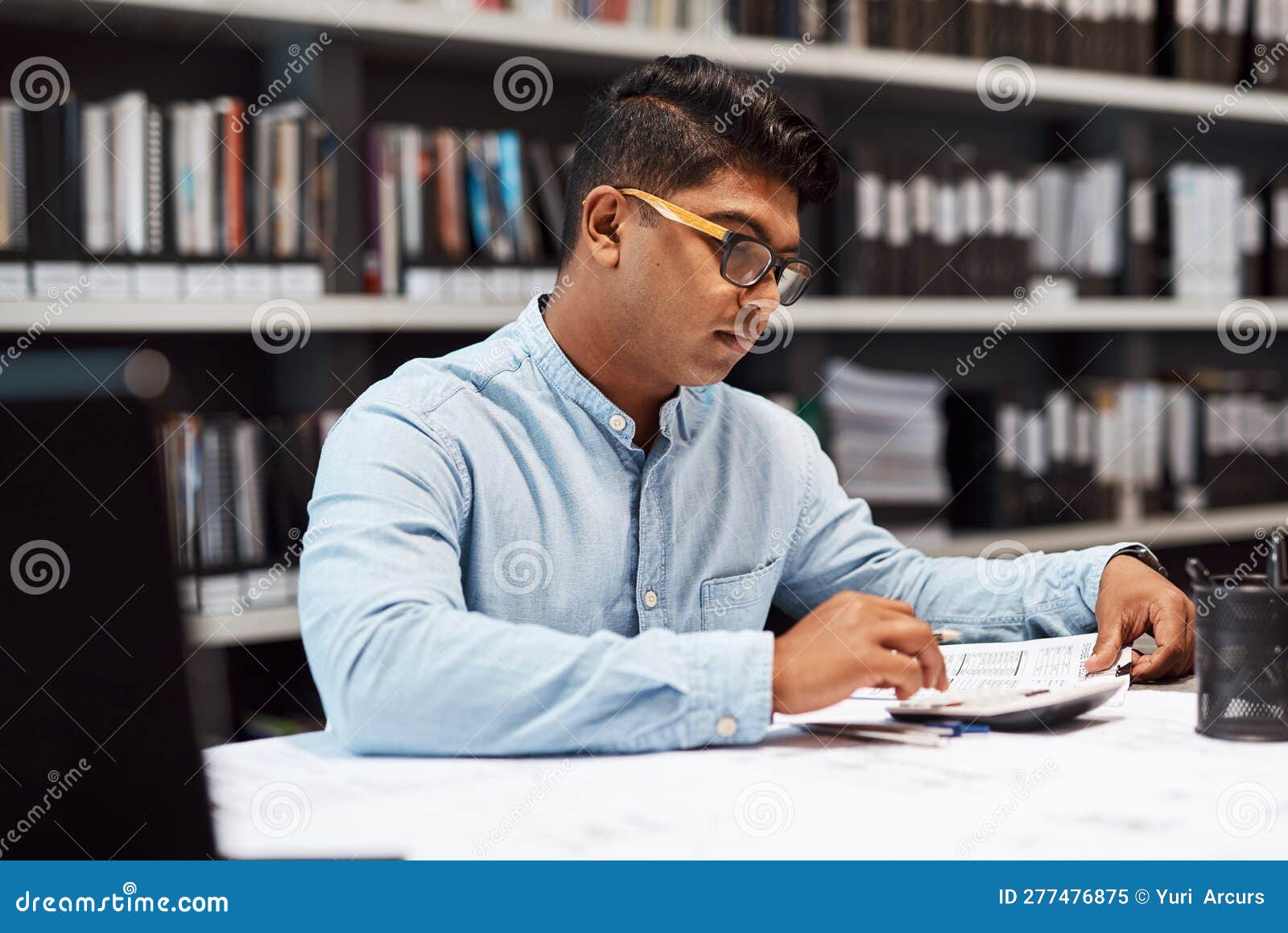 At the Forefront of Fine Building Design. a Young Architect Drawing Up ...