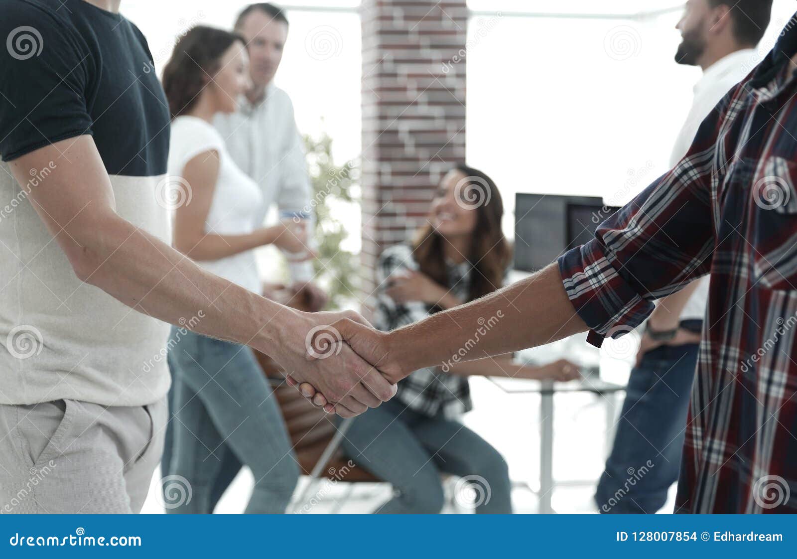 Handshake Colleagues in Creative Office Stock Photo - Image of ...