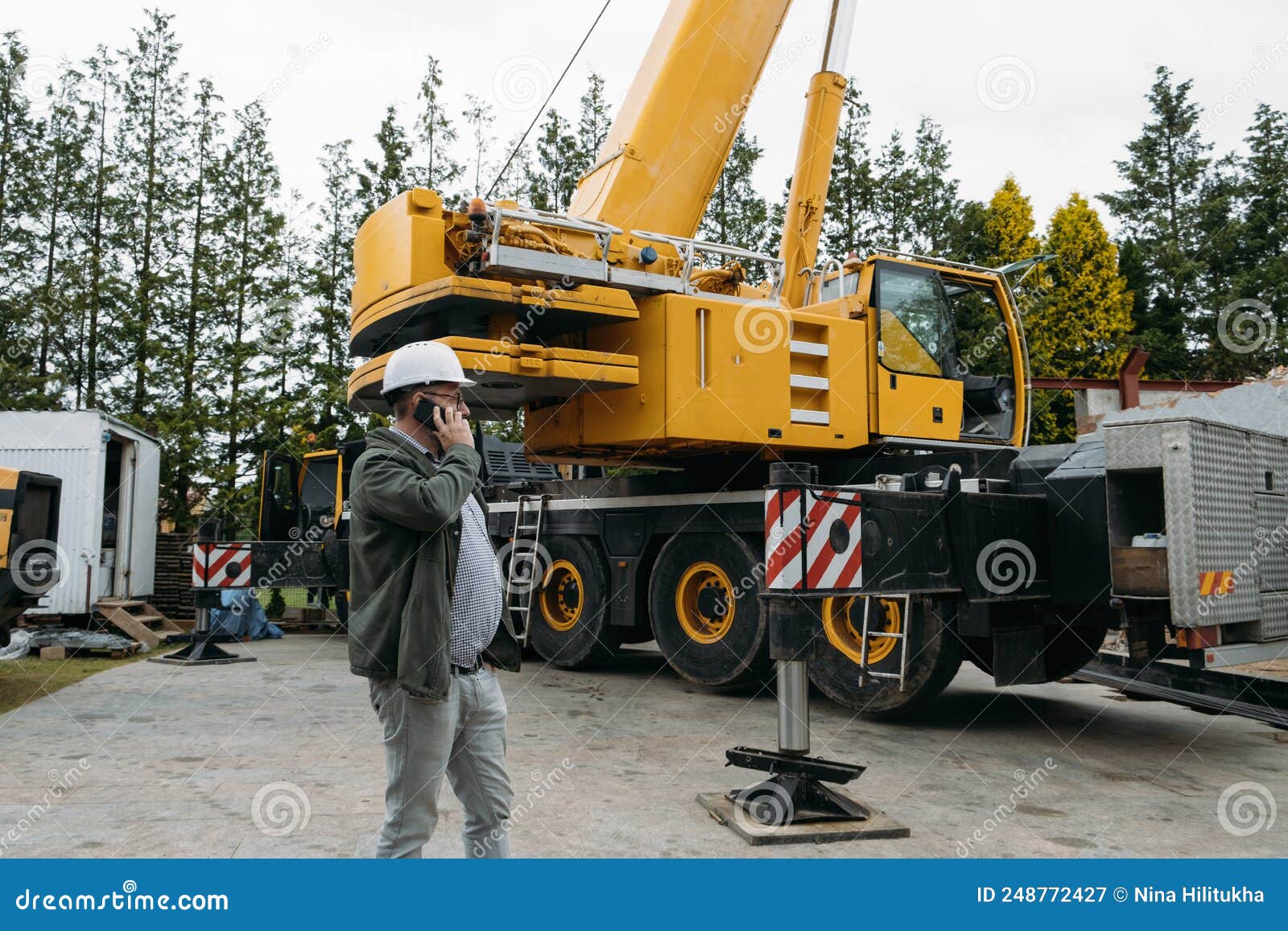 Foreman or Architect on Construction Site Talking by Mobile Phone Stock ...