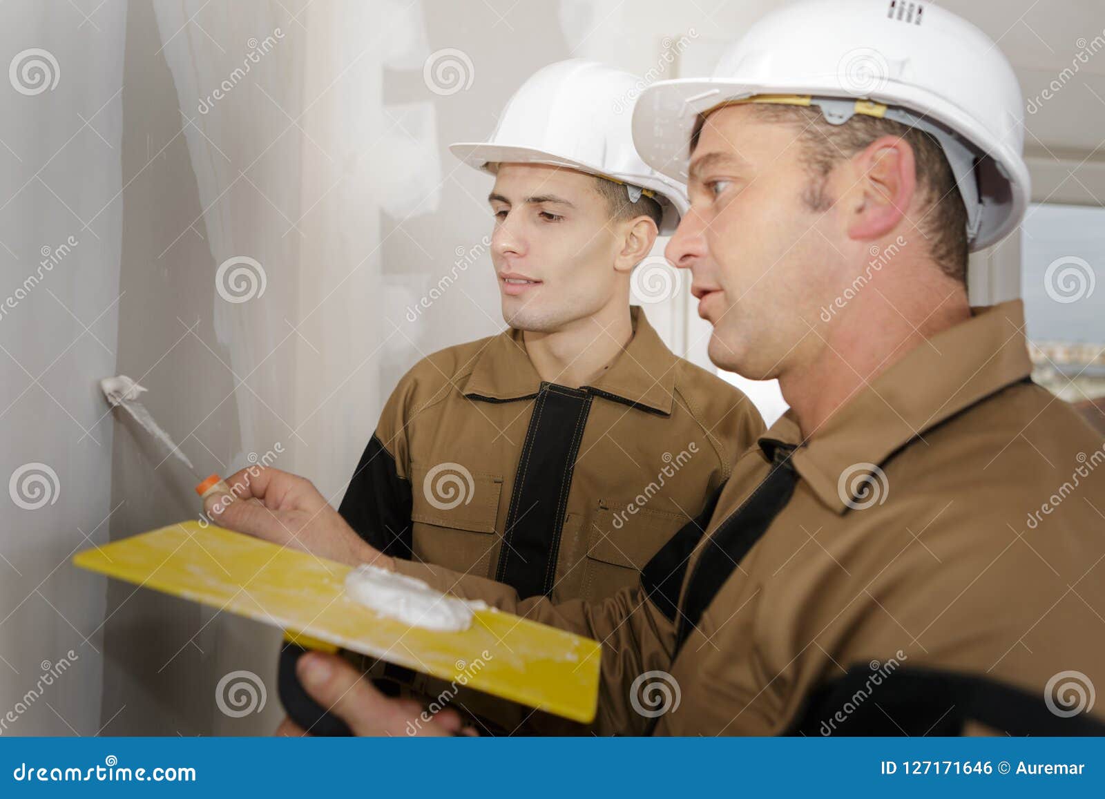 Foreman Builder and Construction Worker Working Indoor Stock Photo ...