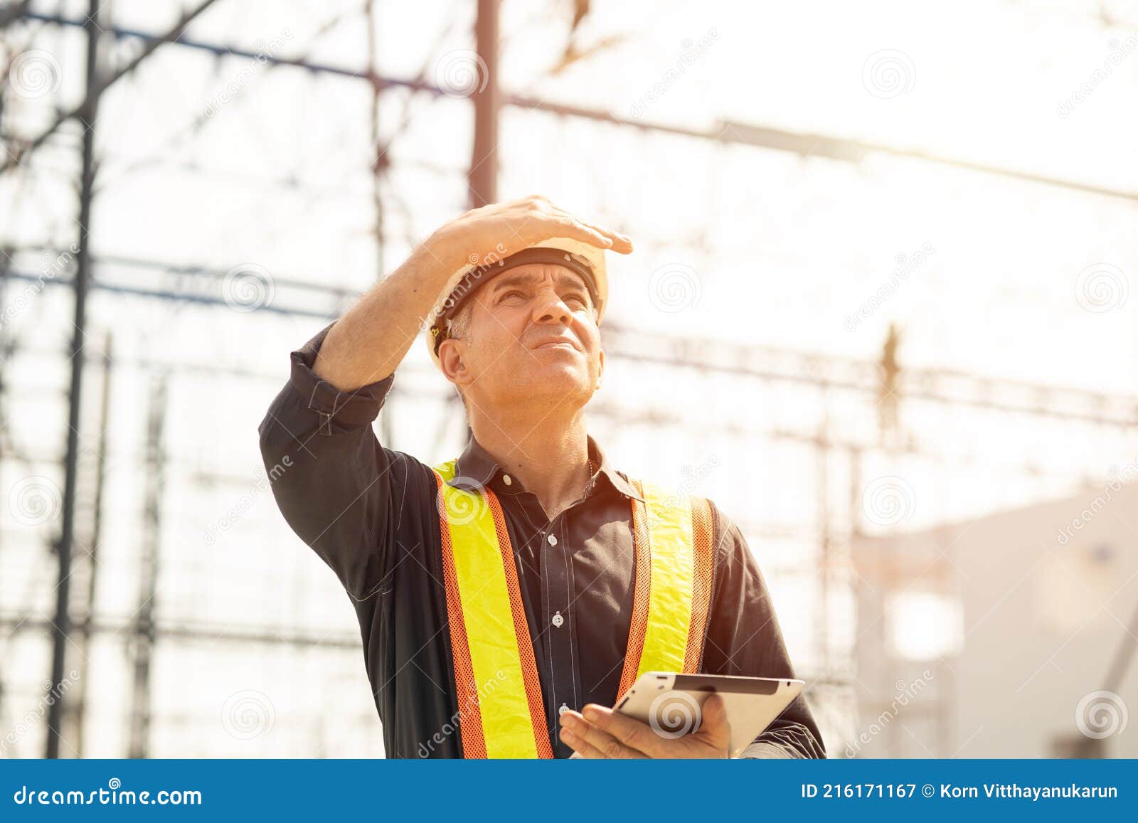 Foreman Builder Engineer Worker Looking at Large Building Construction ...