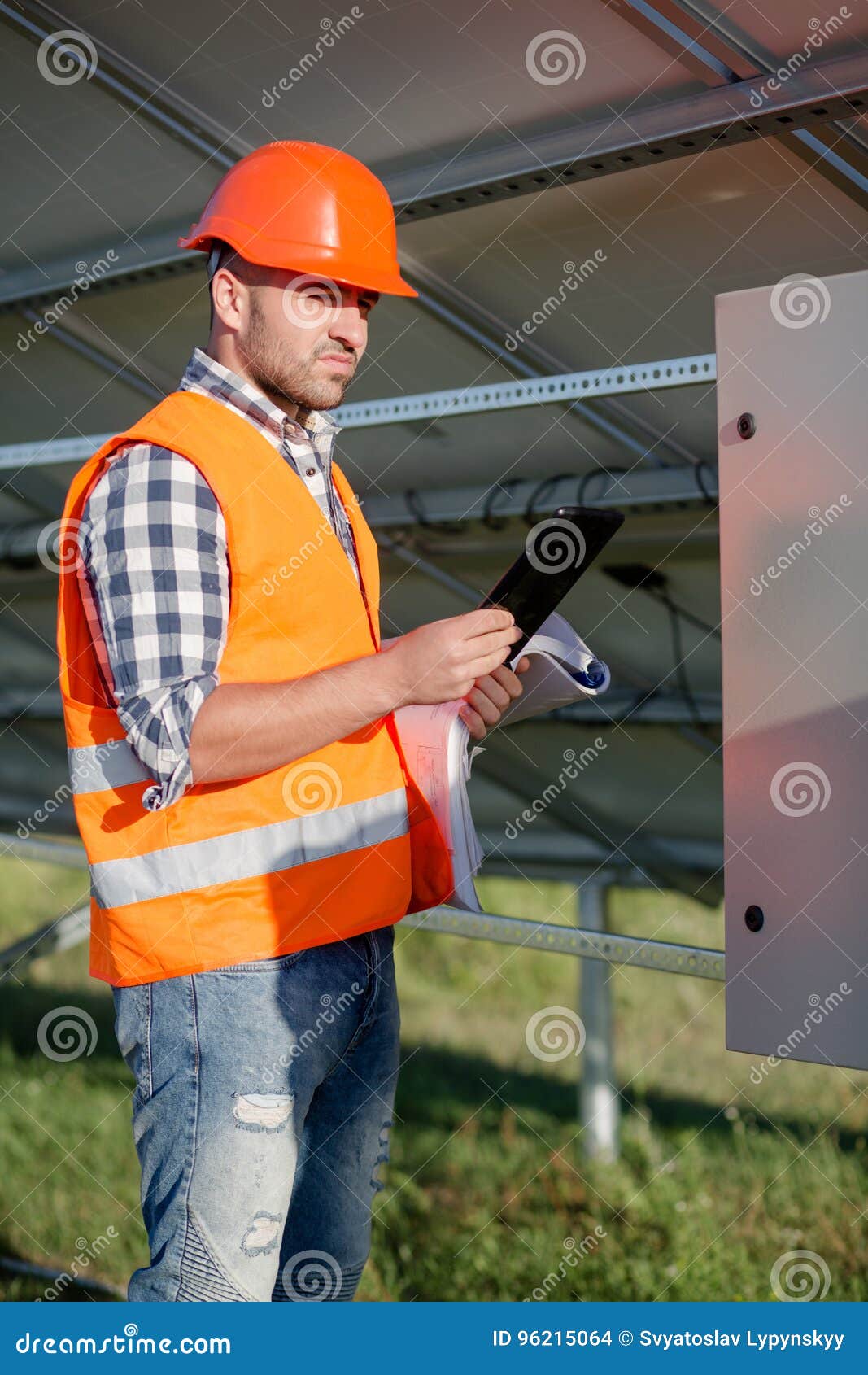 Foreman Checking the Process of Installation of Solar Panels. Stock ...