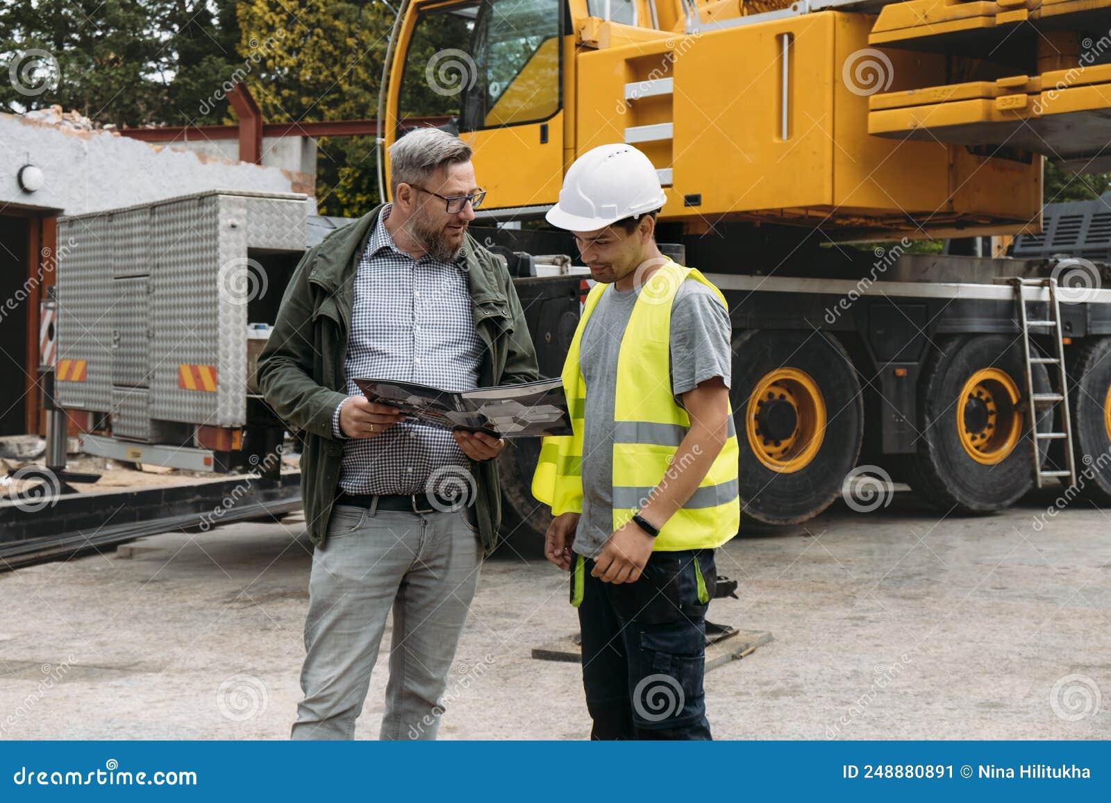 Foreman and Client Discussion Work on Construction Site Architect with ...