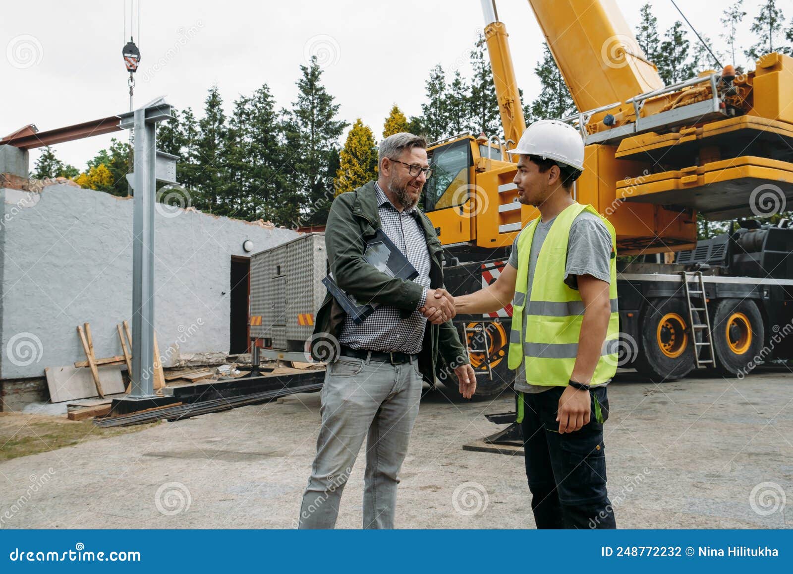 Foreman and Client Discussion Work on Construction Site Architect with ...