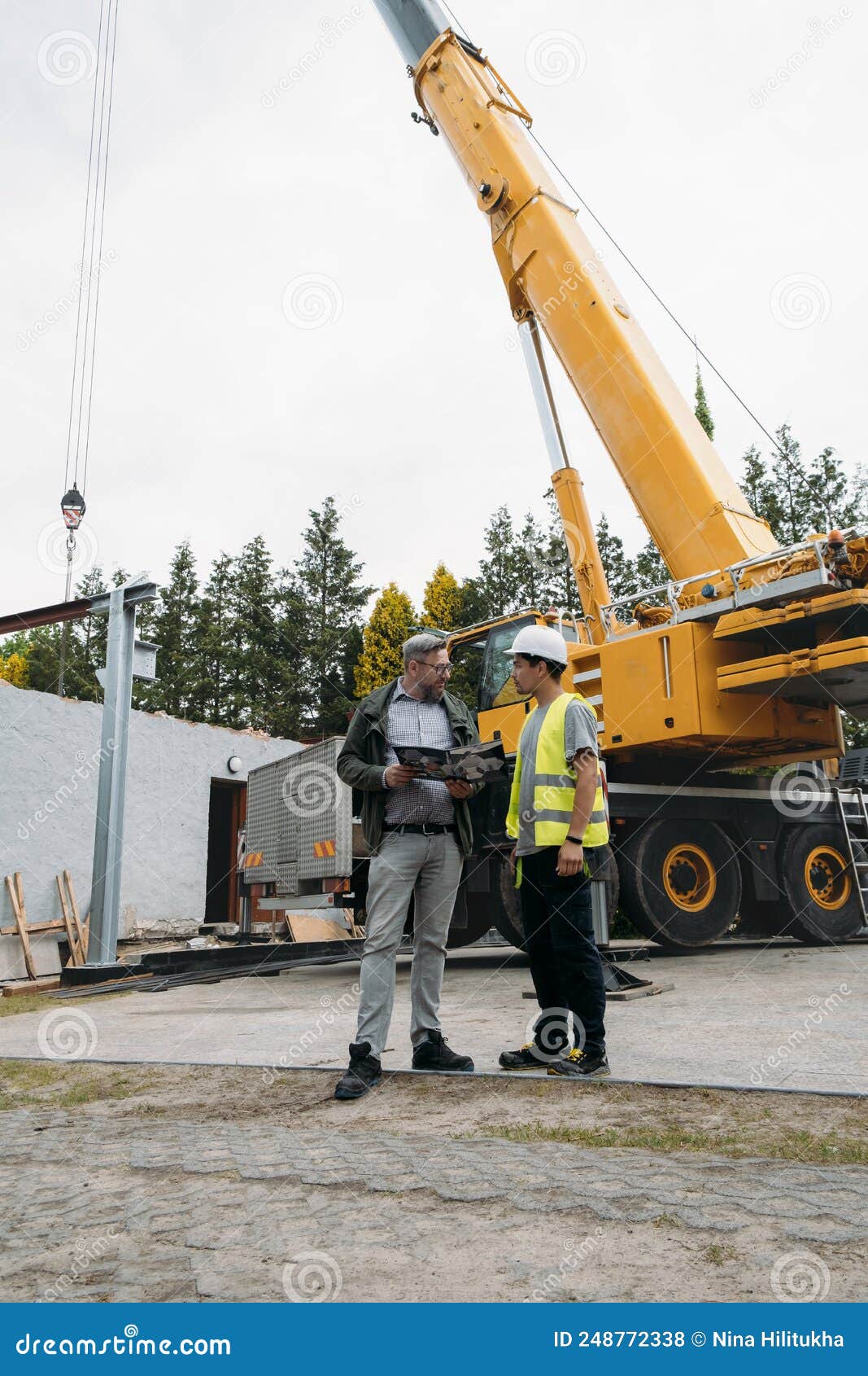 Foreman and Client Discussion Work on Construction Site Architect with ...