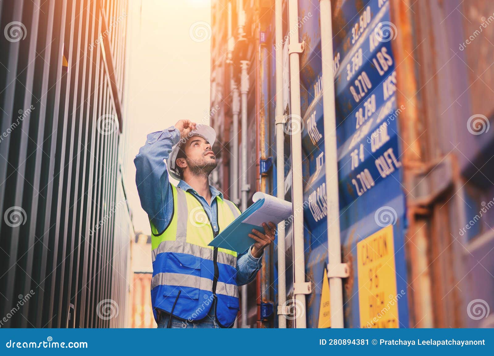 Foreman or Engineer Wears White Helmet and Reflection Shirt To Control ...