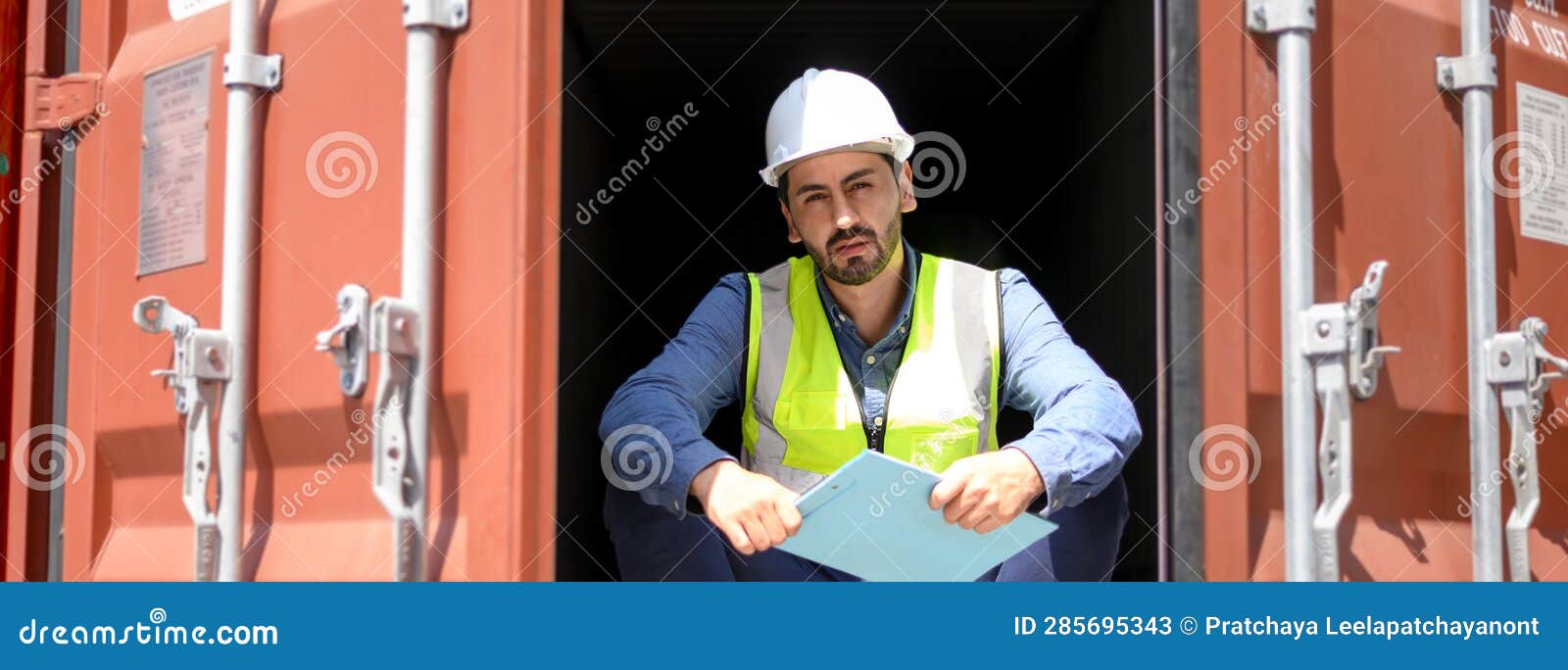 Foreman or Engineer Wears White Helmet and Reflection Shirt To Control ...