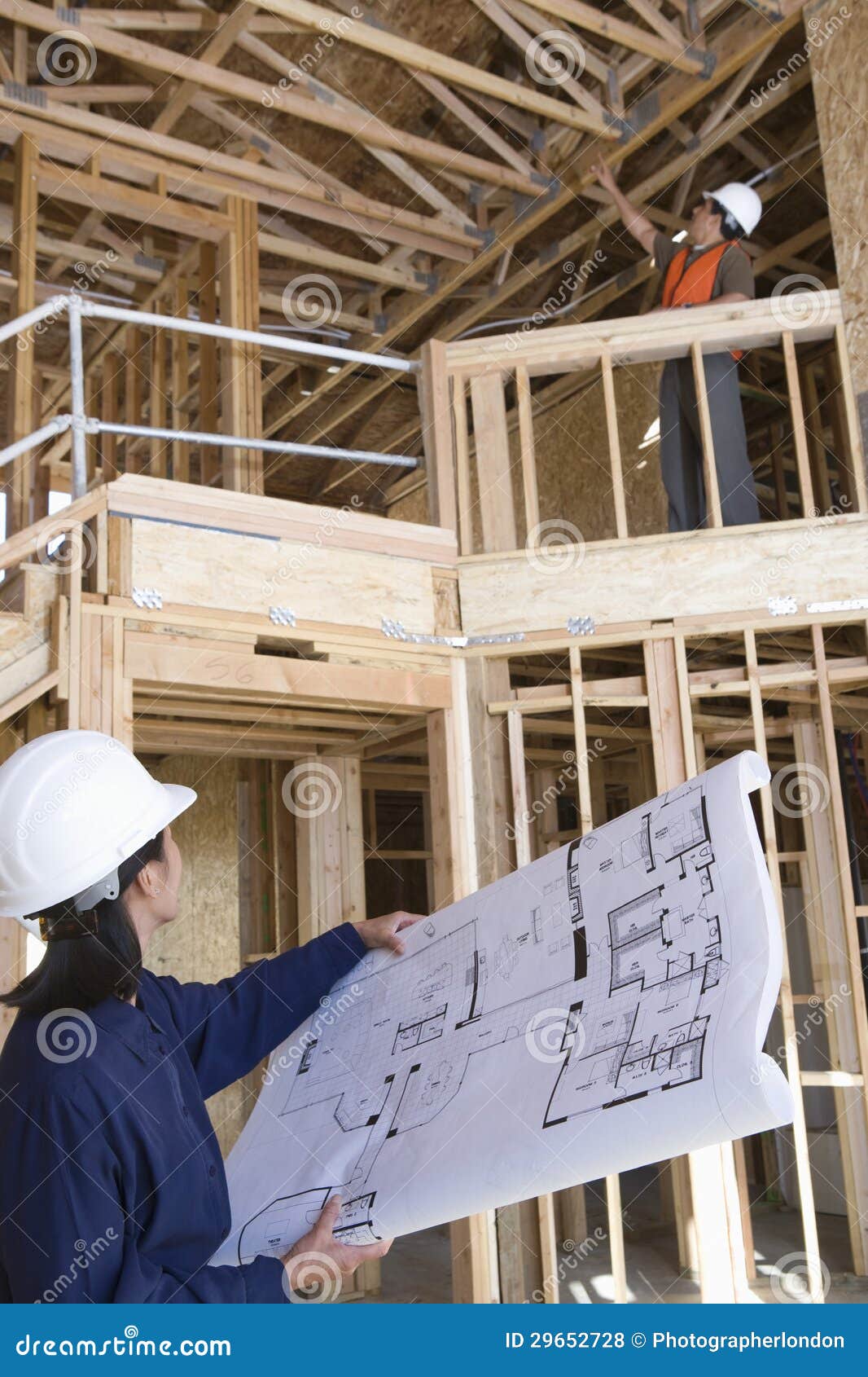 Foreman and Female Engineer at Construction Site Stock Photo - Image of ...