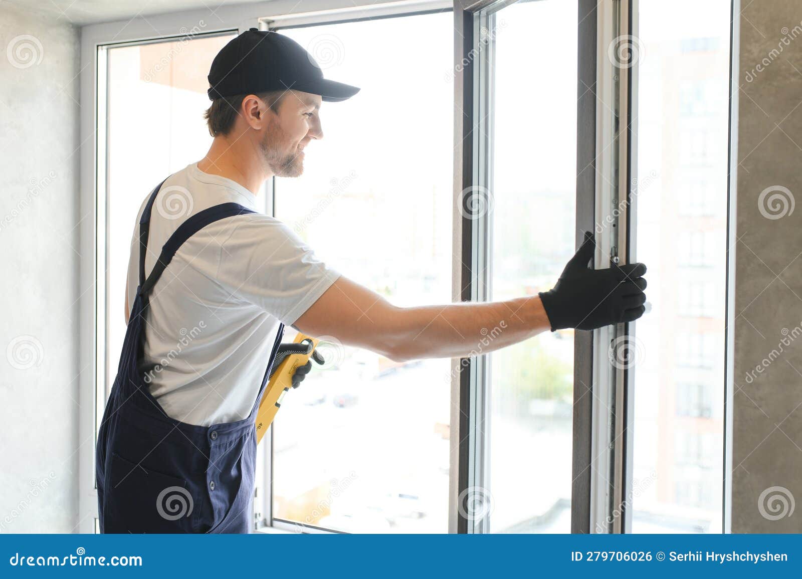 The Foreman Installs a Window Frame in the Room Stock Photo - Image of ...
