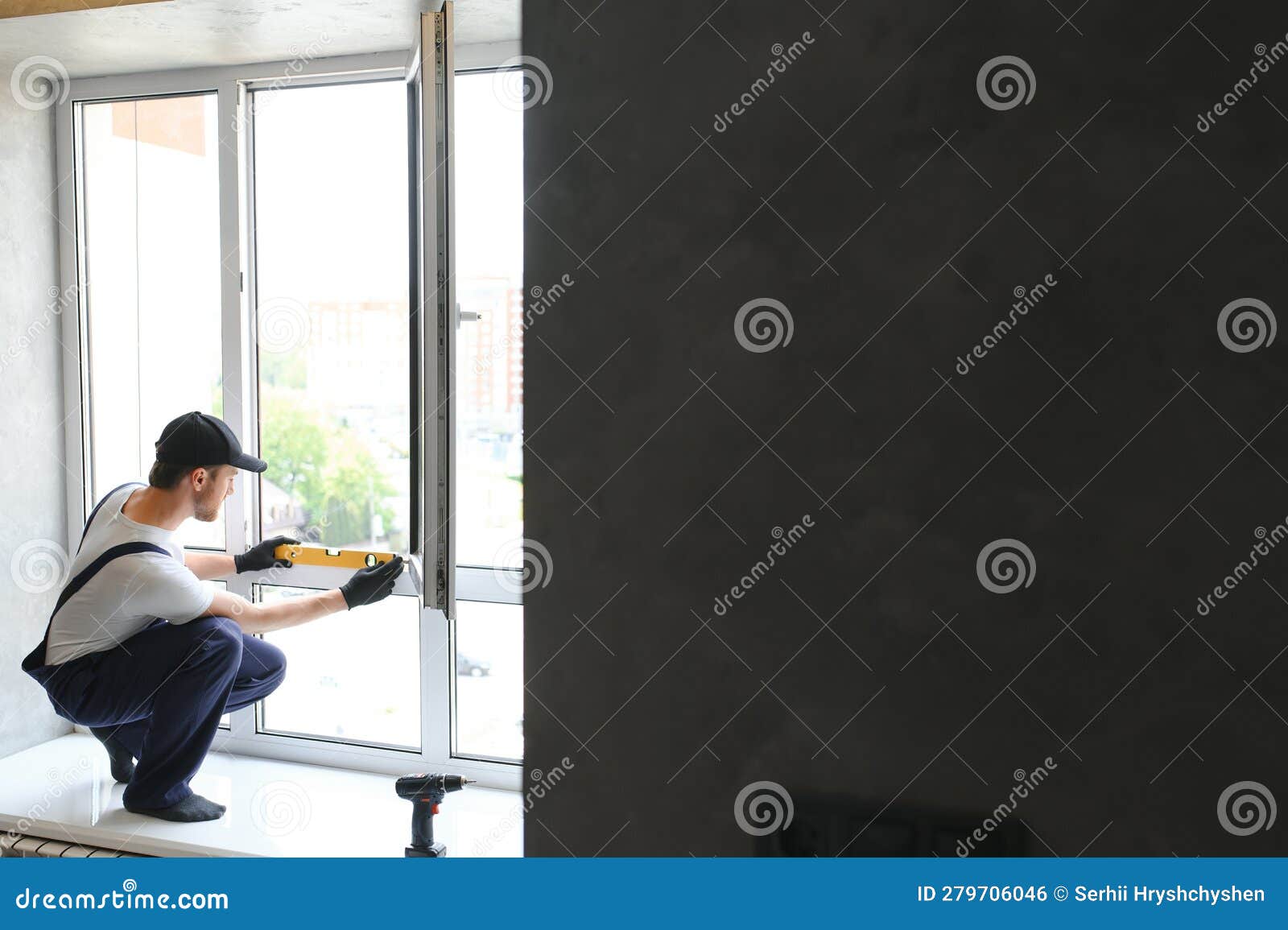 The Foreman Installs a Window Frame in the Room Stock Photo - Image of ...