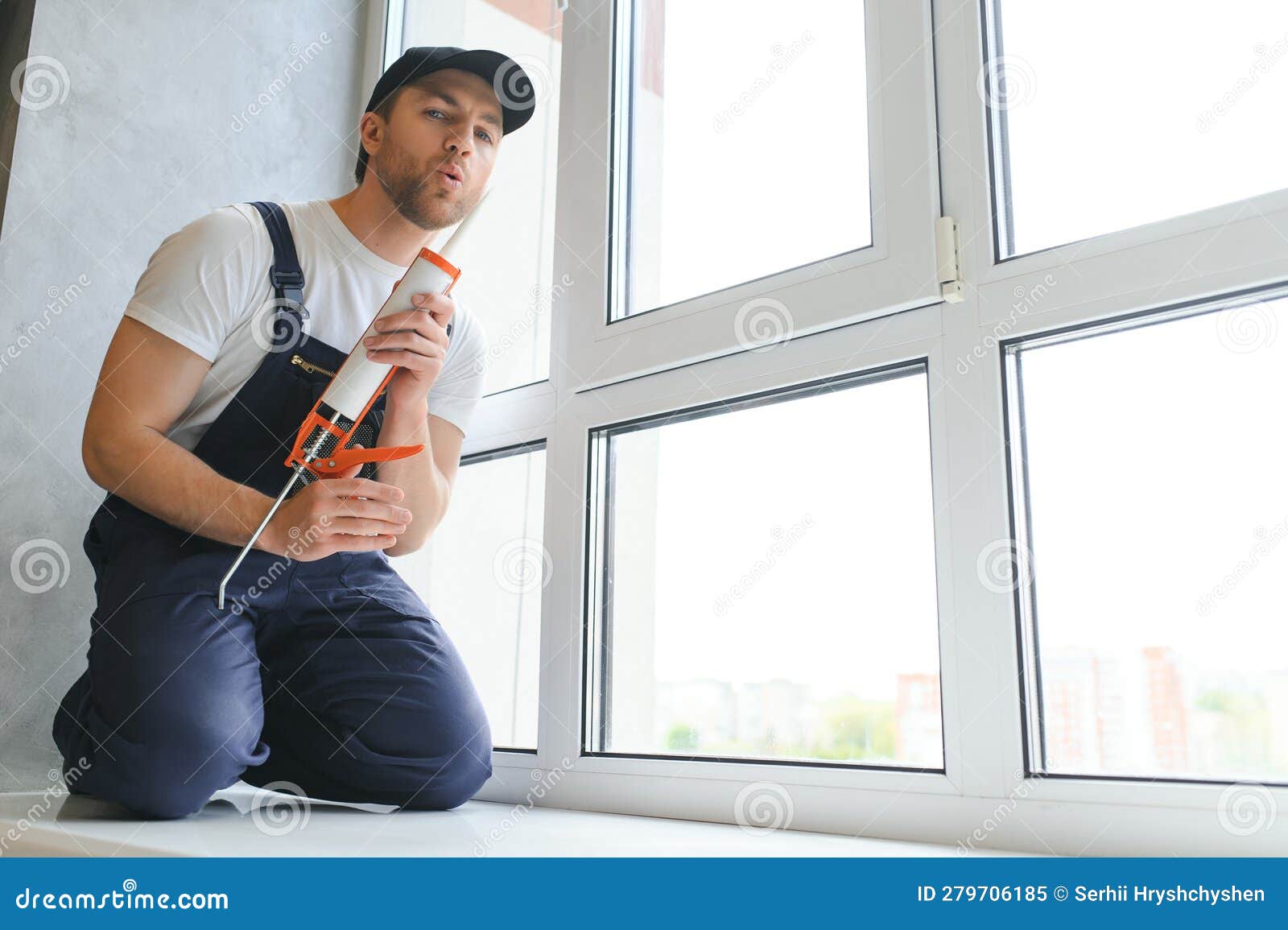 The Foreman Installs a Window Frame in the Room Stock Image - Image of ...