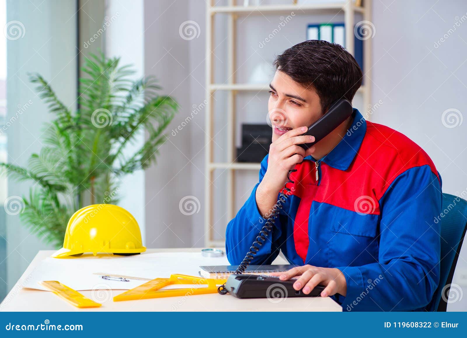 The Foreman Looking at Construction Plan Stock Photo - Image of ...