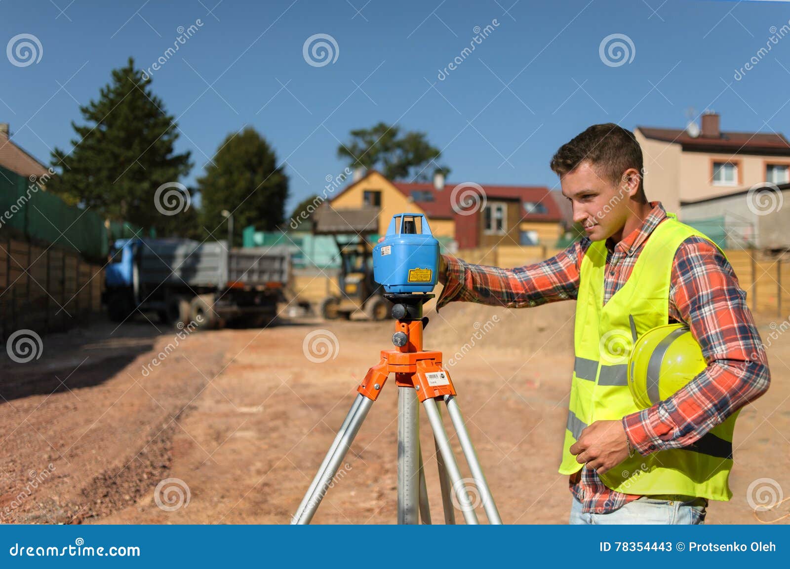 Foreman Makes Construction Measurements at the Beginning of the Work ...