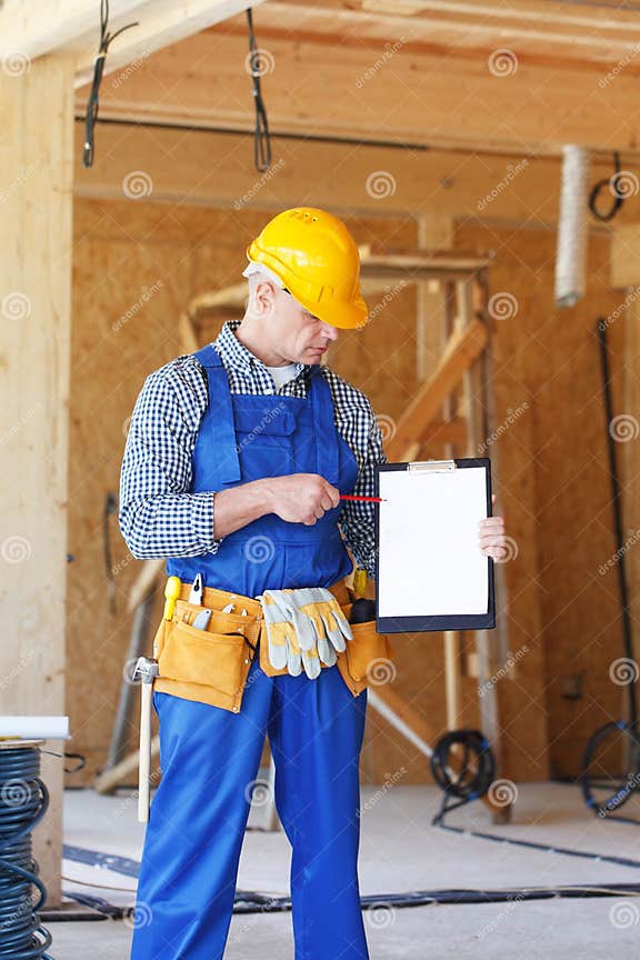 Foreman Pointing at Folder Plate Stock Image - Image of employee ...