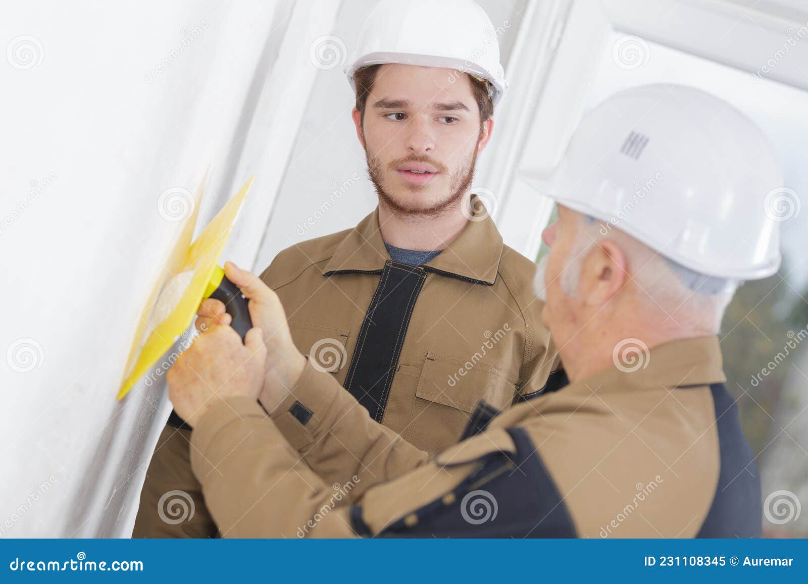 Foreman Showing Apprentice How To Use Plaster and Trowel Stock Image ... Foreman Showing Apprentice How To Use Plaster and Trowel Stock Image ...
