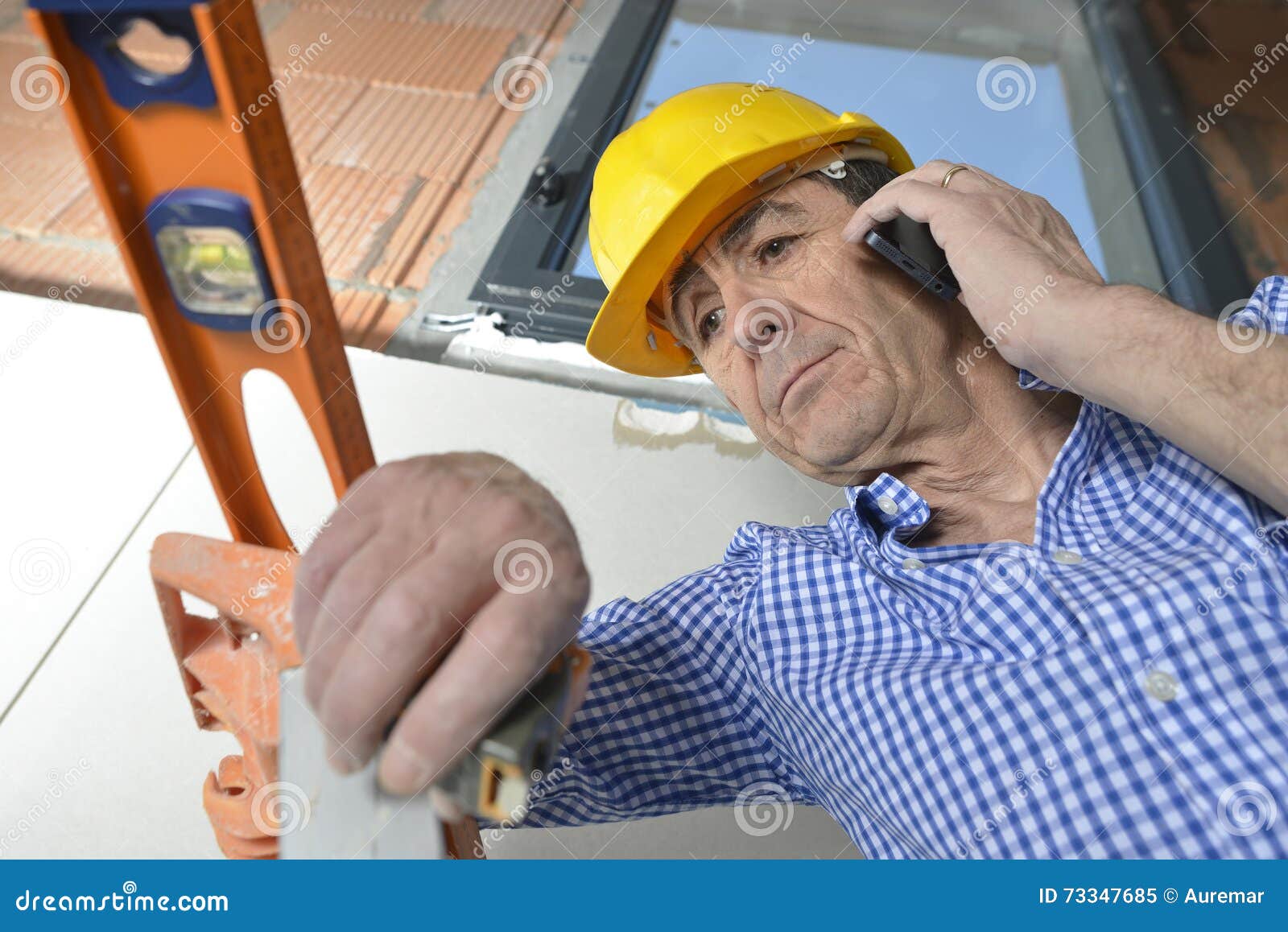 Foreman Speaking on Telephone Stock Image - Image of call, person: 73347685