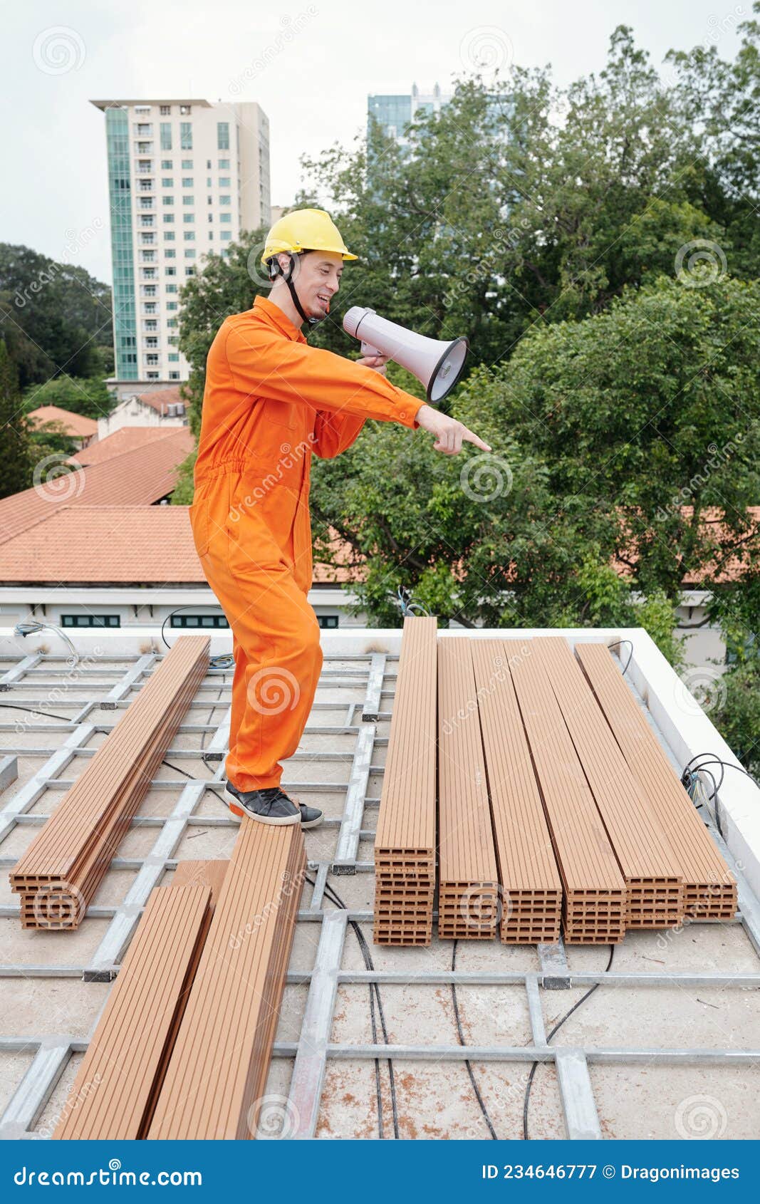 Foreman Standing on Rooftop with Loudspeaker Stock Image - Image of ...