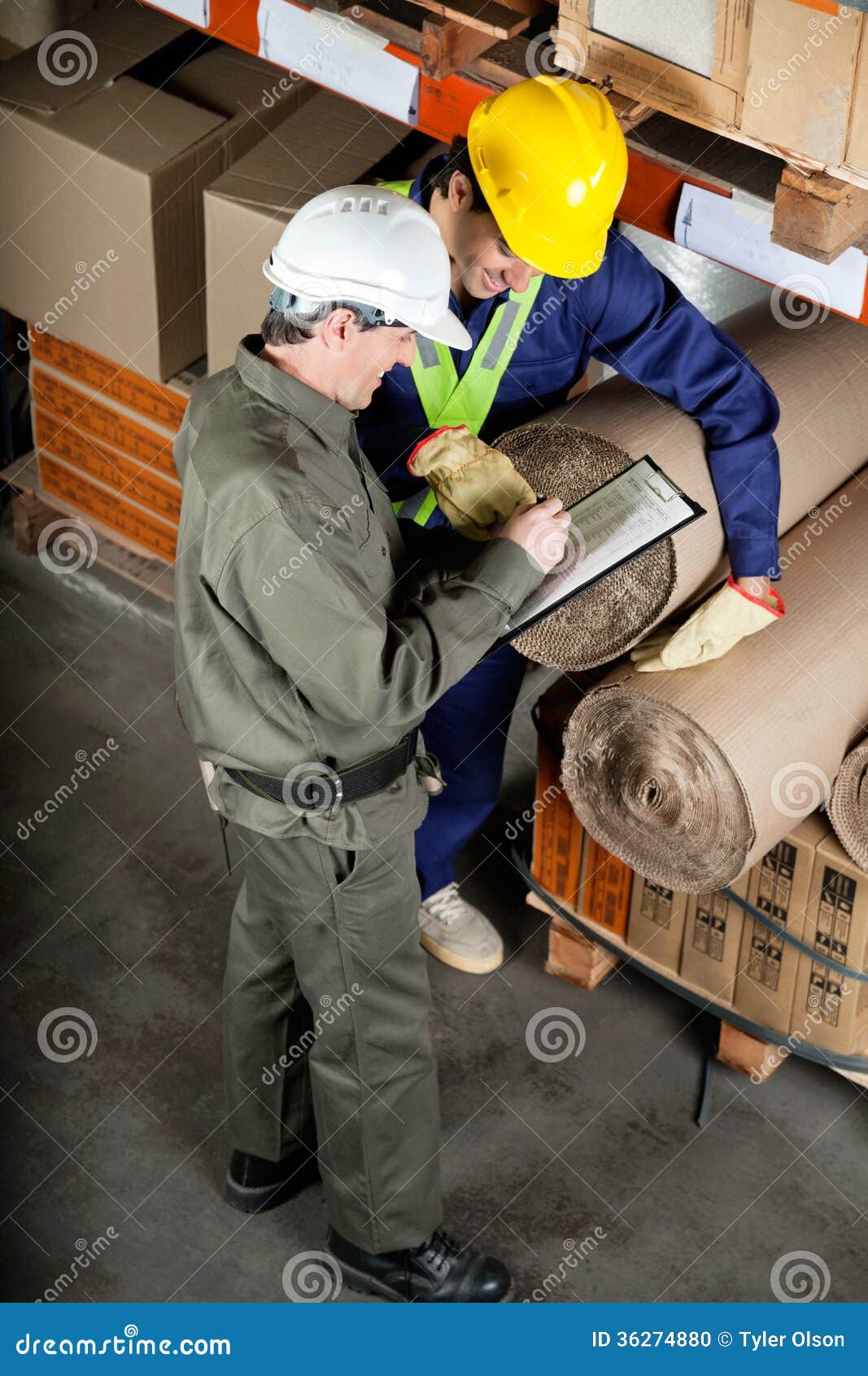 Foreman with Supervisor Writing Notes at Warehouse Stock Photo - Image ...