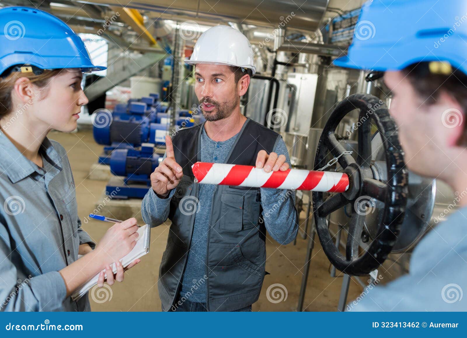 Foreman Warning New Recruits Danger in Factory Stock Photo - Image of ...