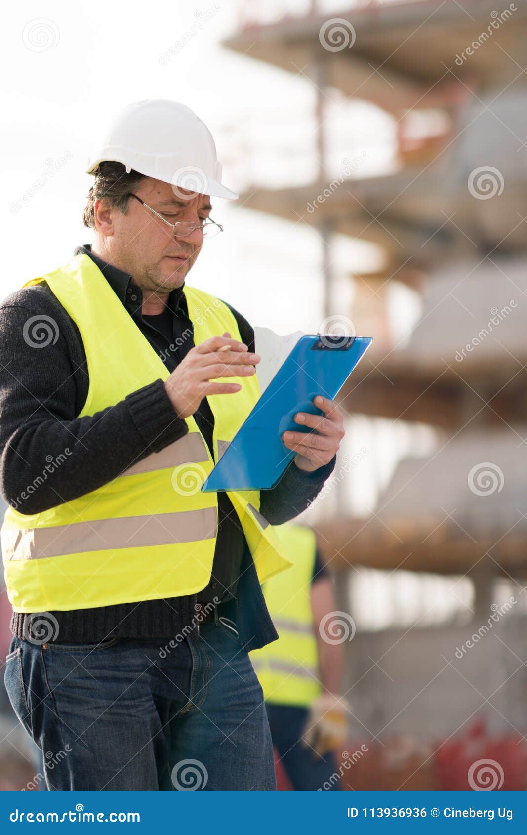 Foreman at Work on Construction Site Stock Photo - Image of housing ...