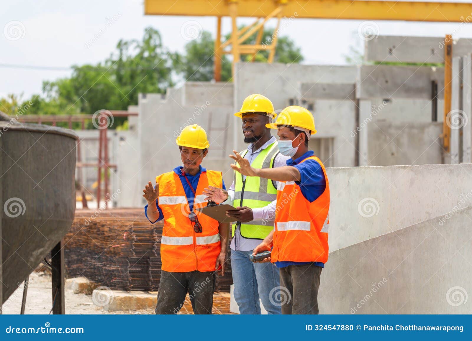Foreman and Worker Team Discussing at Precast Concrete Factory Site ...