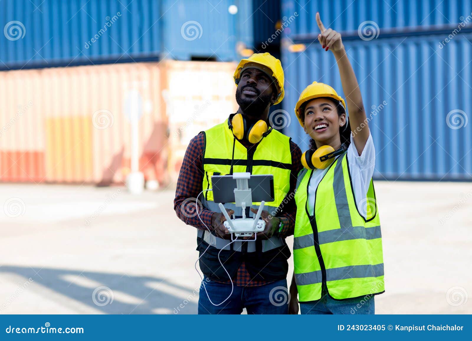 Foreman or Worker Use Remote Controller Piloting Drone at Containers ...