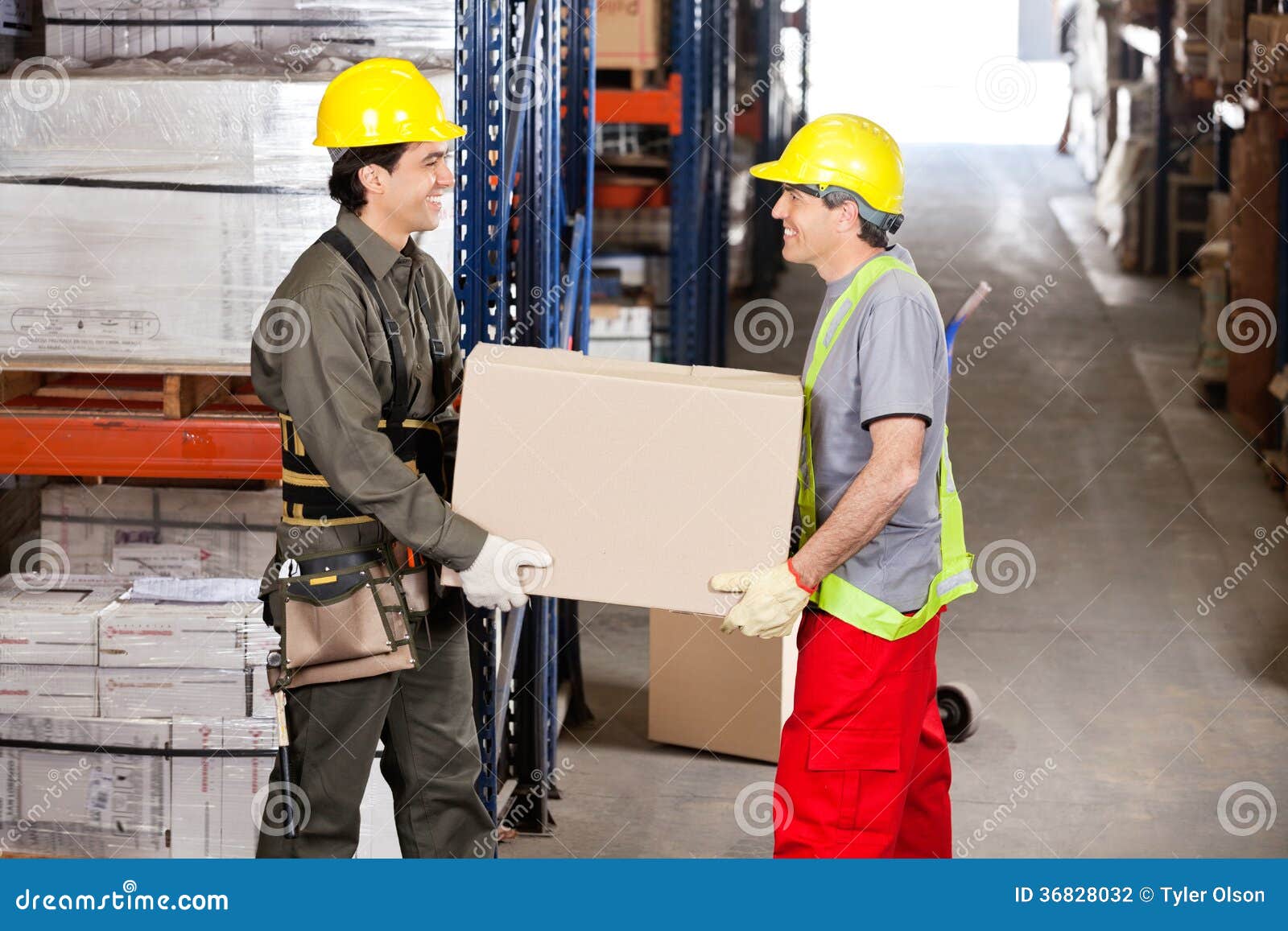 Foremen Carrying Cardboard Box at Warehouse Stock Photo - Image of ...