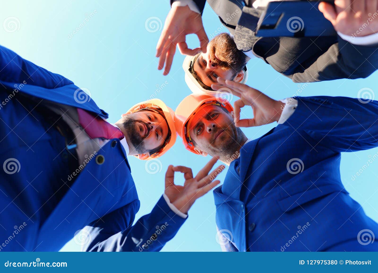 Foremen Decide upon Leadership on Blue Background. Engineers Hold ...