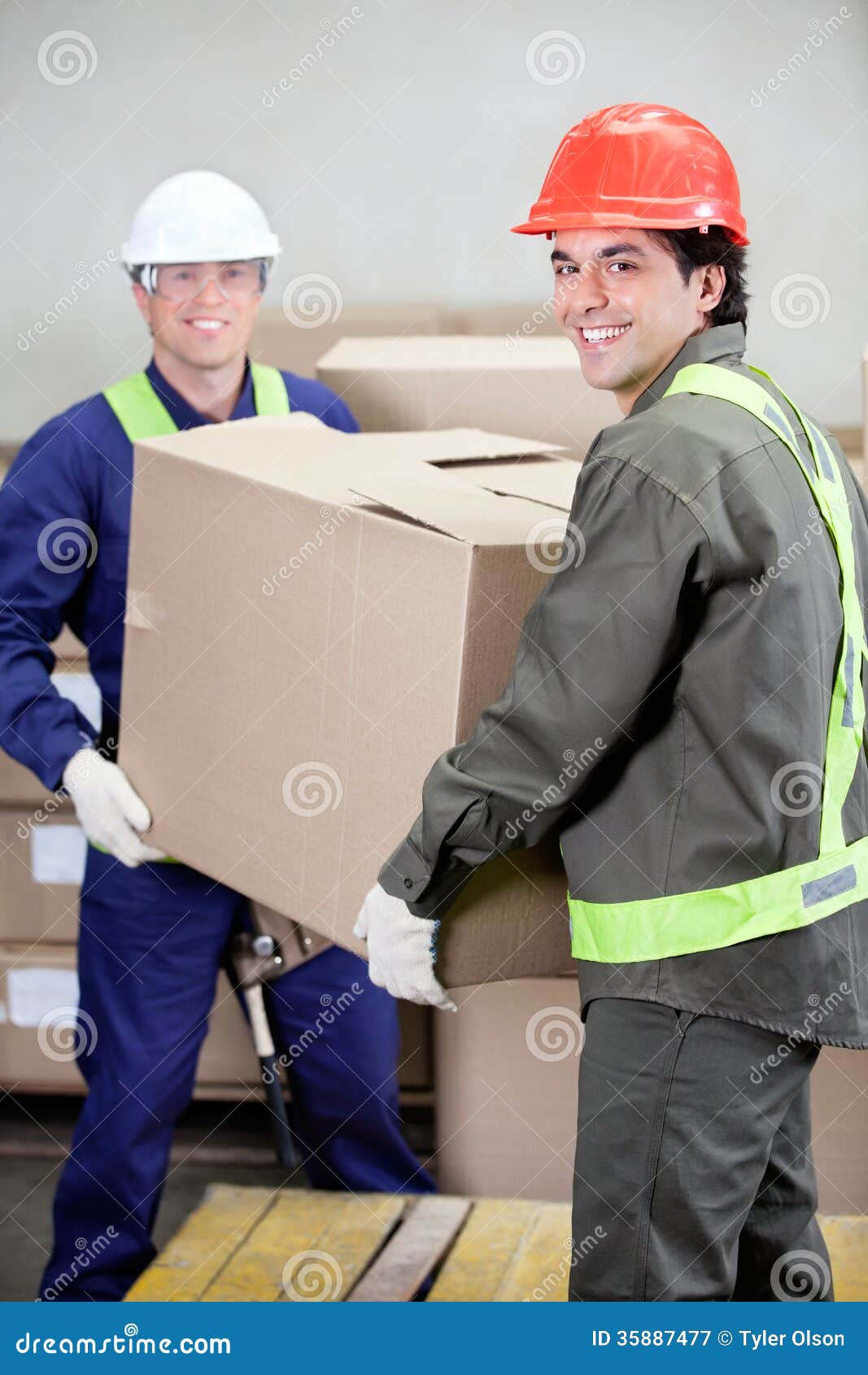 Foremen Lifting Cardboard Box in Warehouse Stock Image - Image of ...