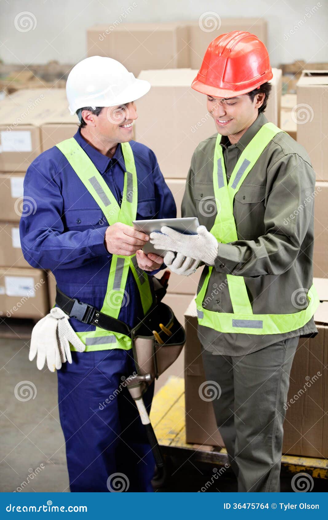 Foremen Using Digital Tablet in Warehouse Stock Photo - Image of people ...