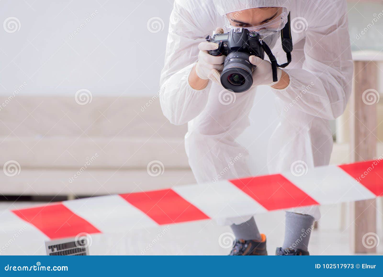 The Forensic Expert At Crime Scene Doing Investigation Royalty-Free ...