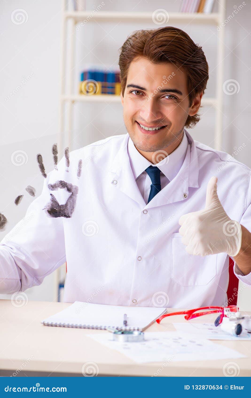 The Forensic Expert Studying Fingerprints in the Lab Stock Photo ...