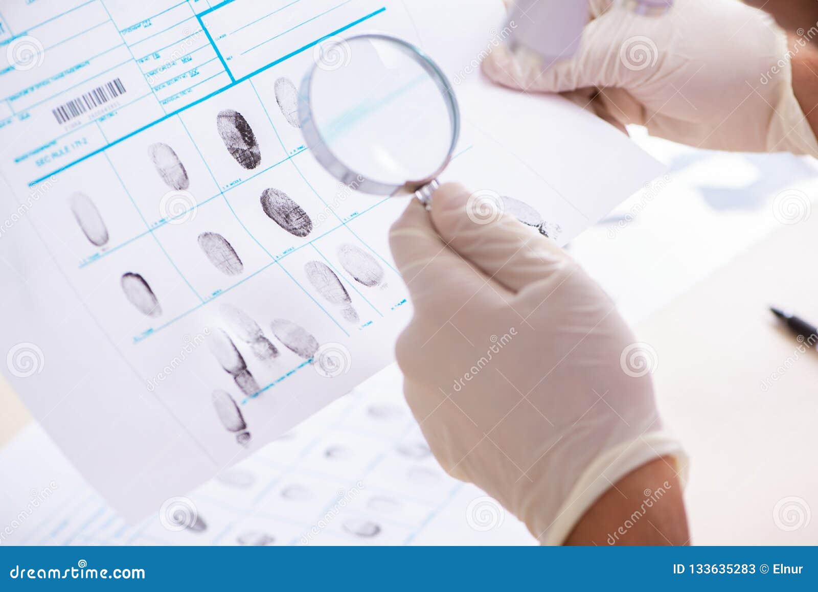 The Forensic Expert Studying Fingerprints in the Lab Stock Image ...