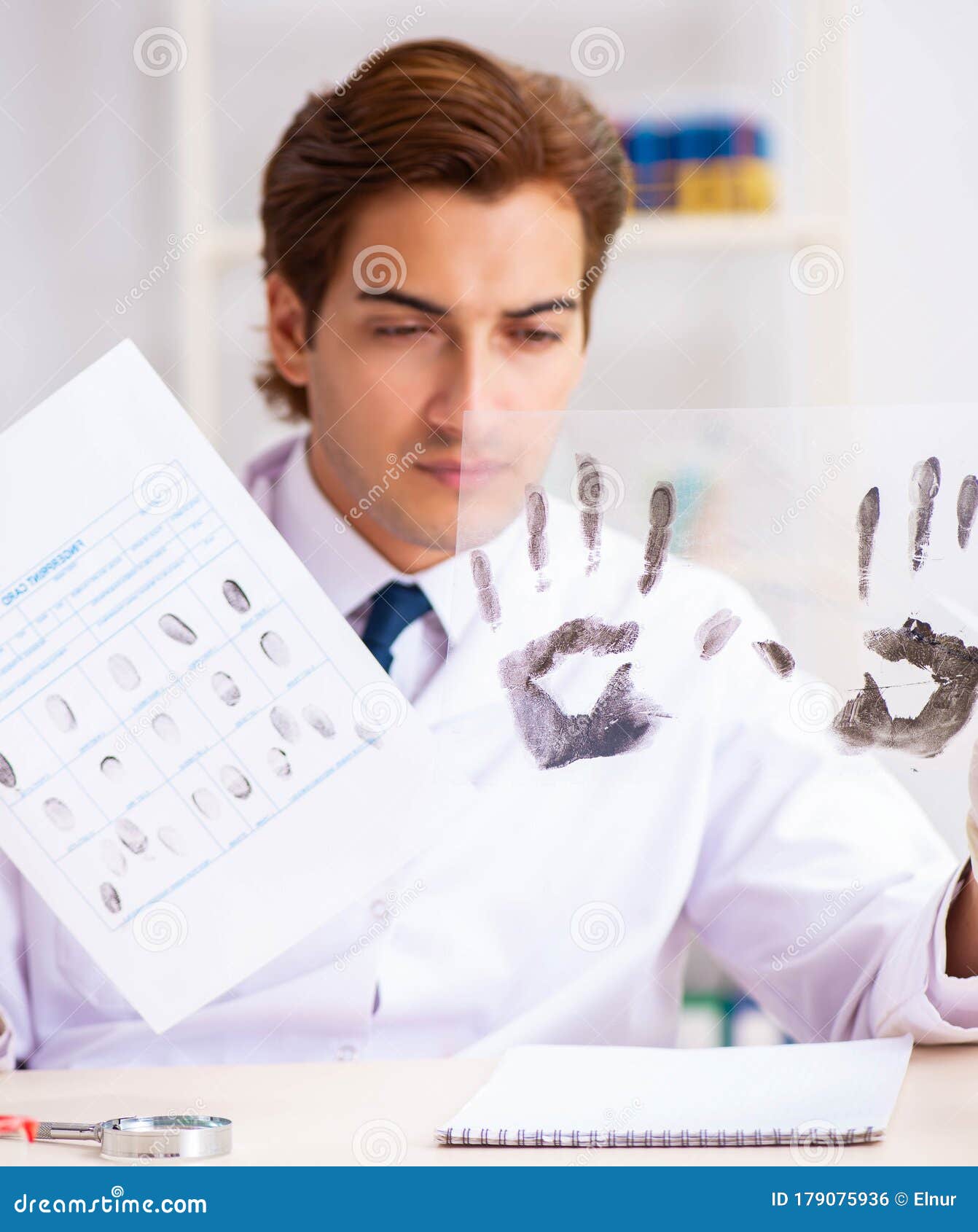 Forensic Expert Studying Fingerprints in the Lab Stock Photo - Image of ...