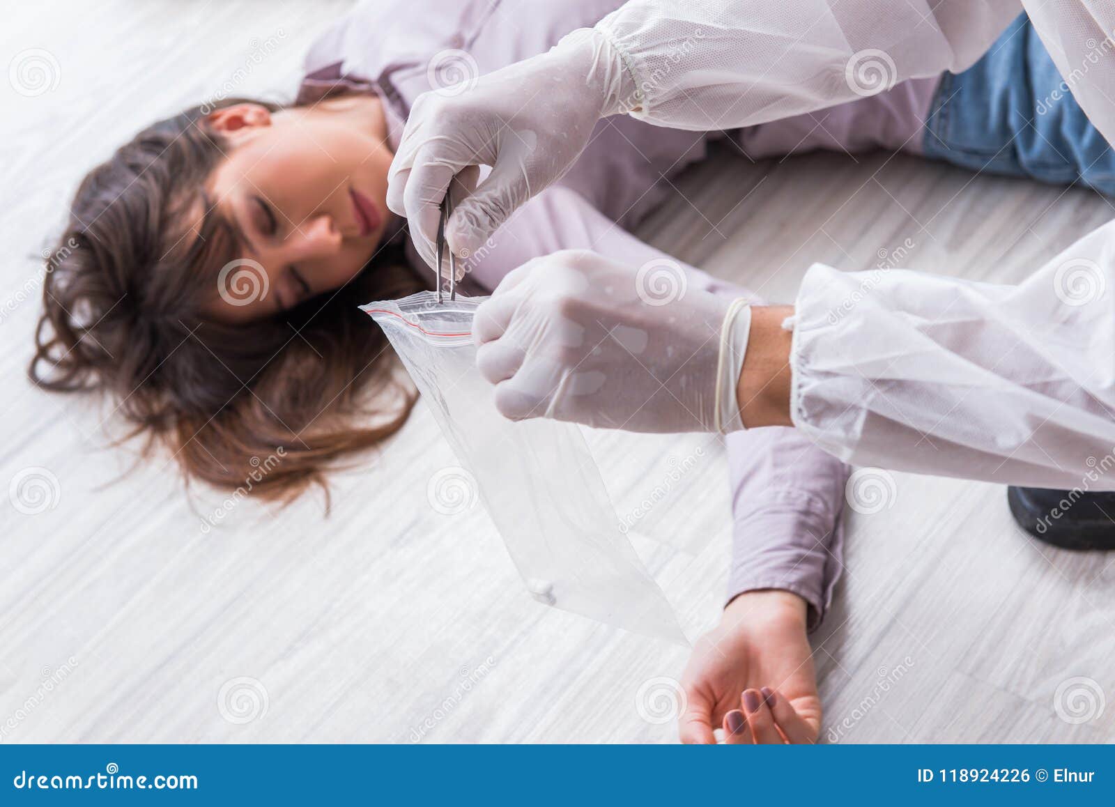 Forensic Investigator At The Crime Scene Investigating Woman Mur Stock
