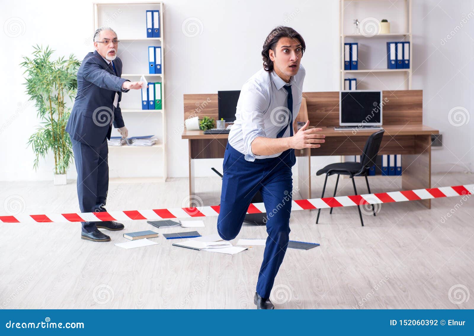 Forensic Investigator Investigating Theft in the Office Stock Photo ...