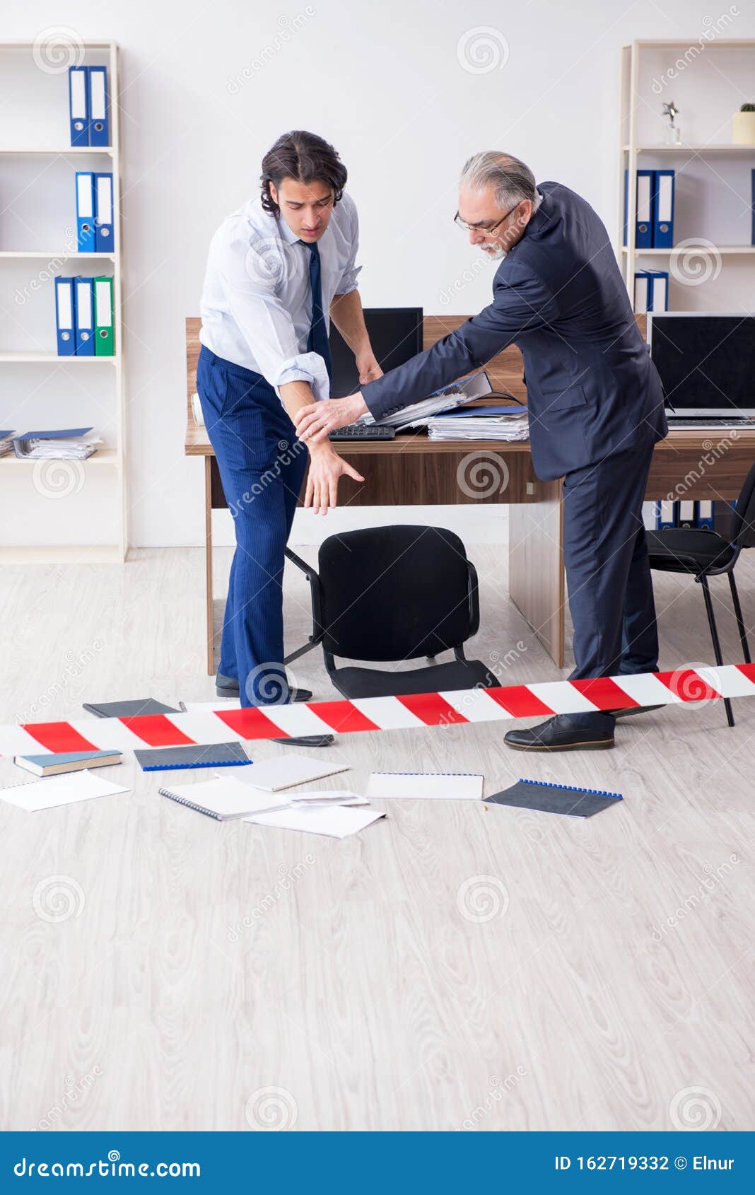 Forensic Investigator Investigating Theft in the Office Stock Photo ...