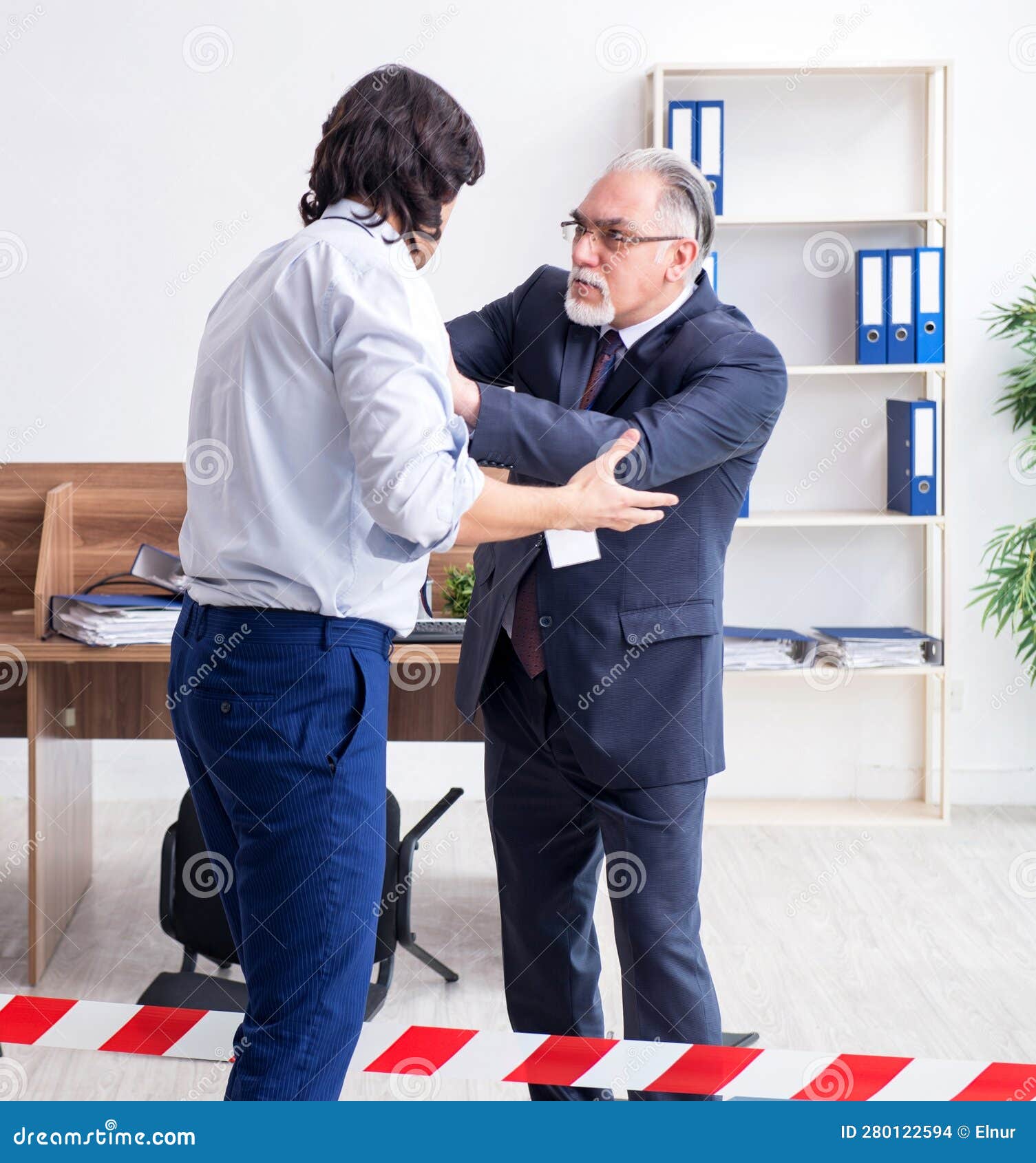 Forensic Investigator Investigating Theft in the Office Stock Photo ...