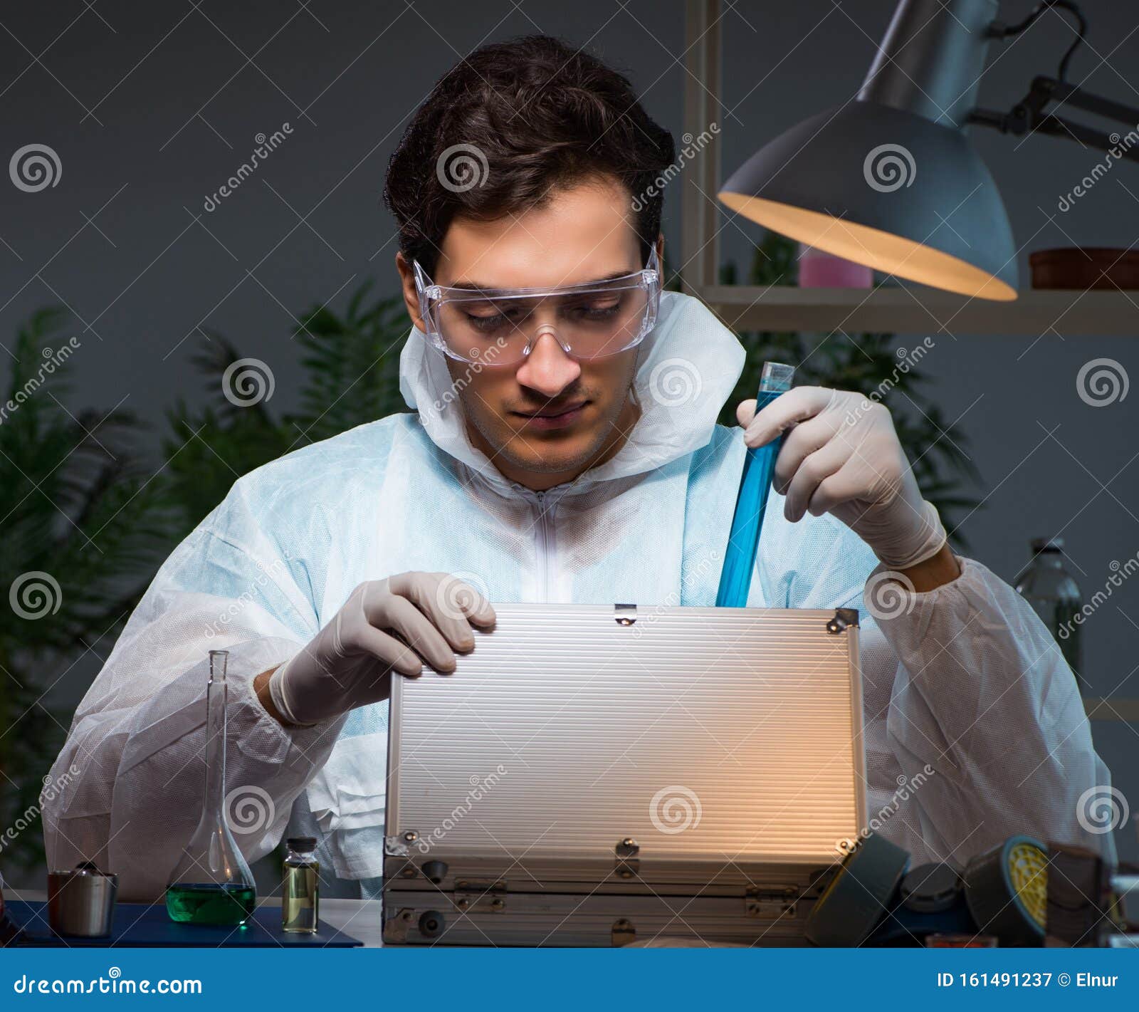 Forensic Investigator Working in Lab Looking for Evidence Stock Image ...