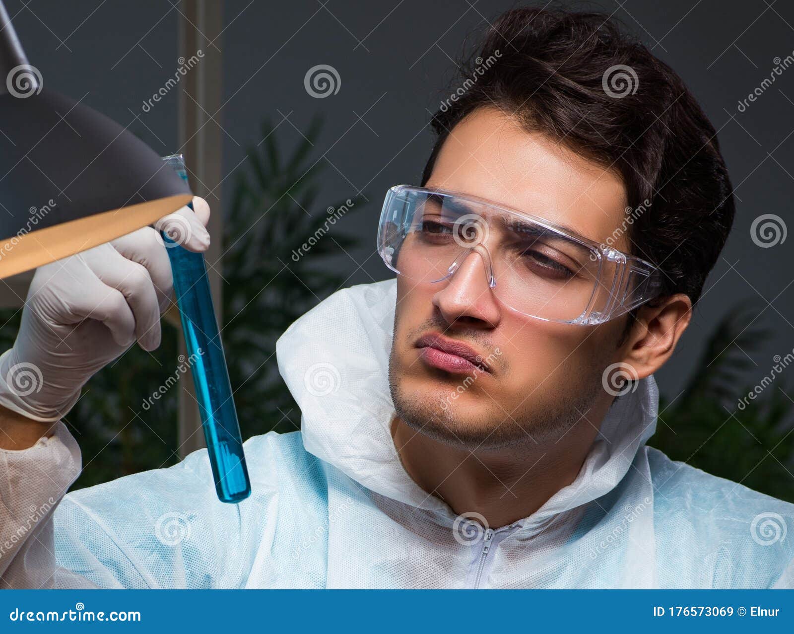 Forensic Investigator Working in Lab Looking for Evidence Stock Image ...