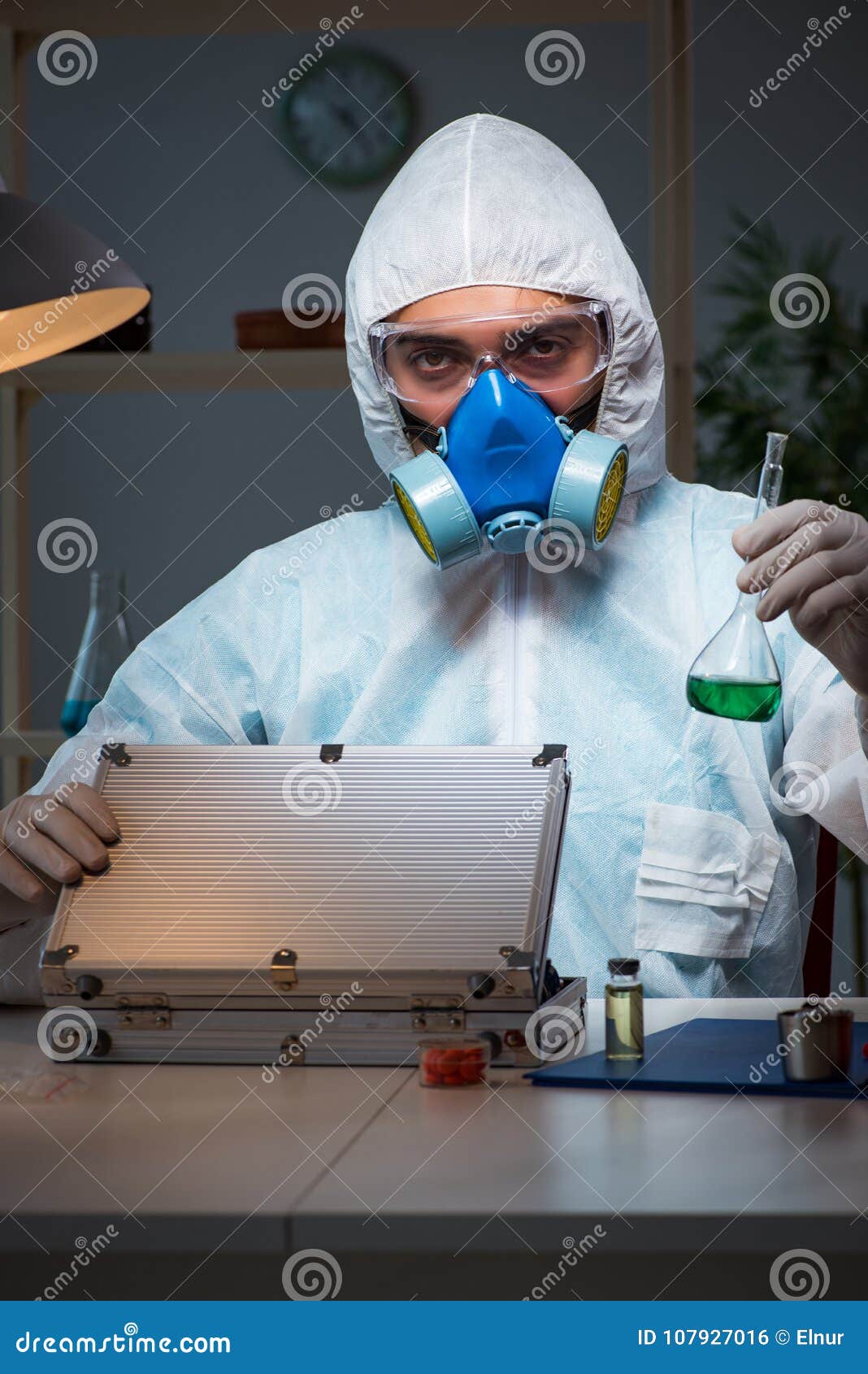 The Forensic Investigator Working in Lab Looking for Evidence Stock ...