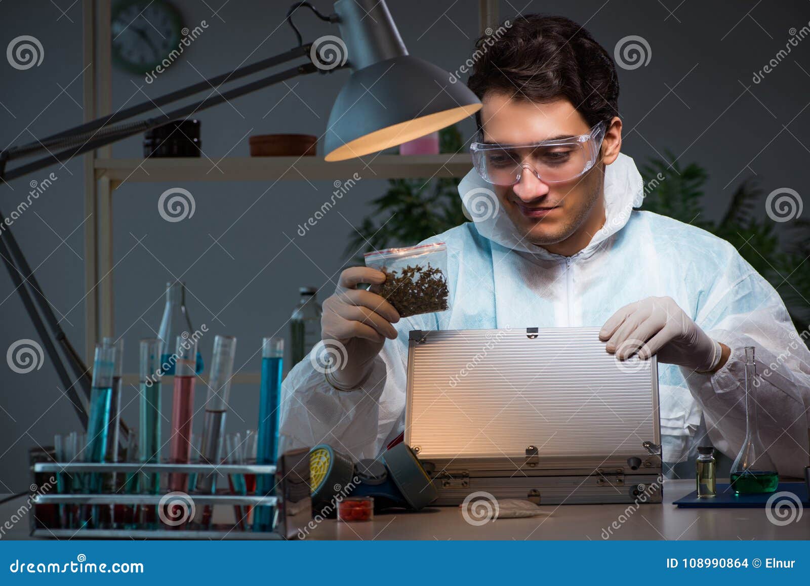The Forensic Investigator Working in Lab Looking for Evidence Stock ...